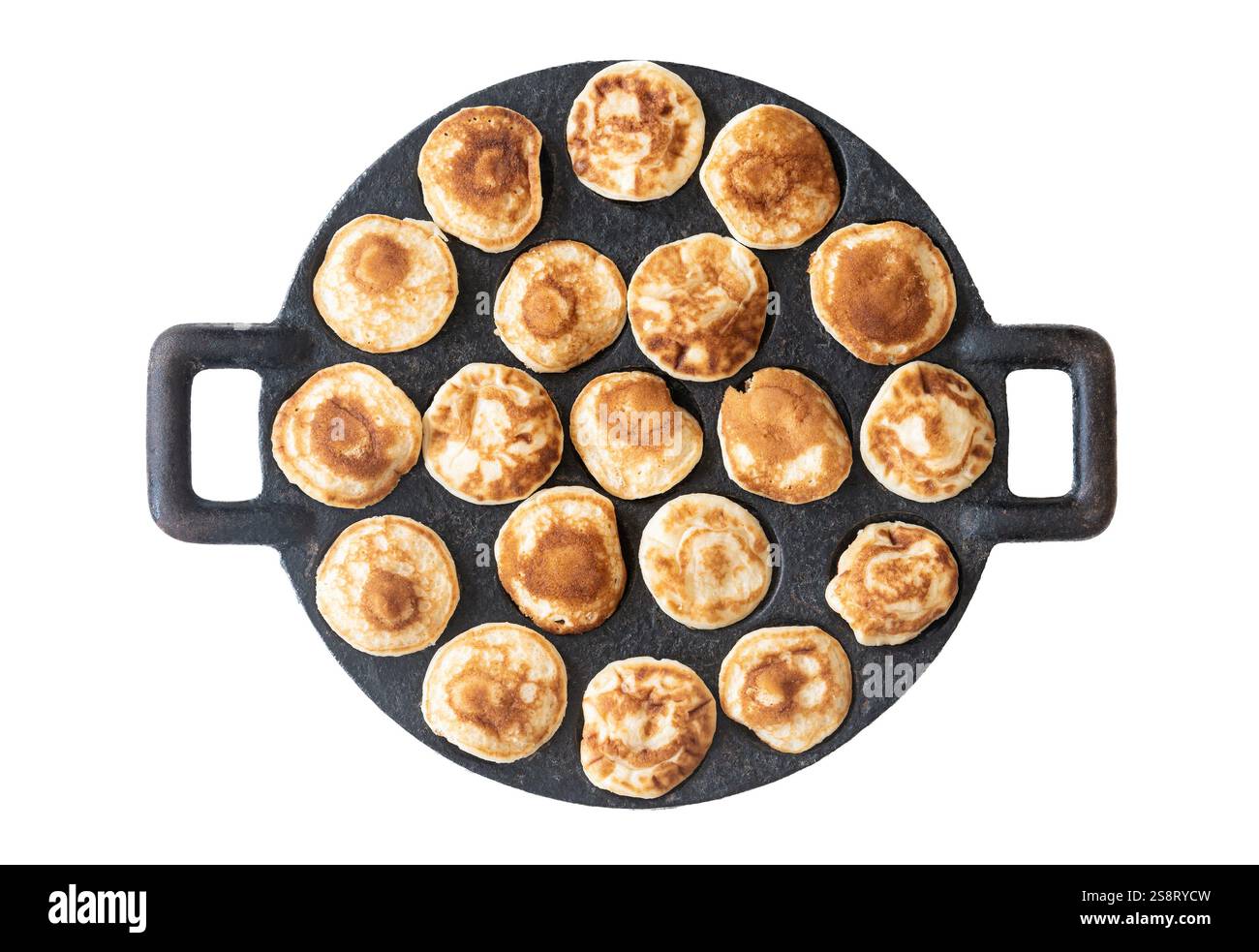 Dutch poffertjes on cast iron poffertjes pan isolated on white Stock ...