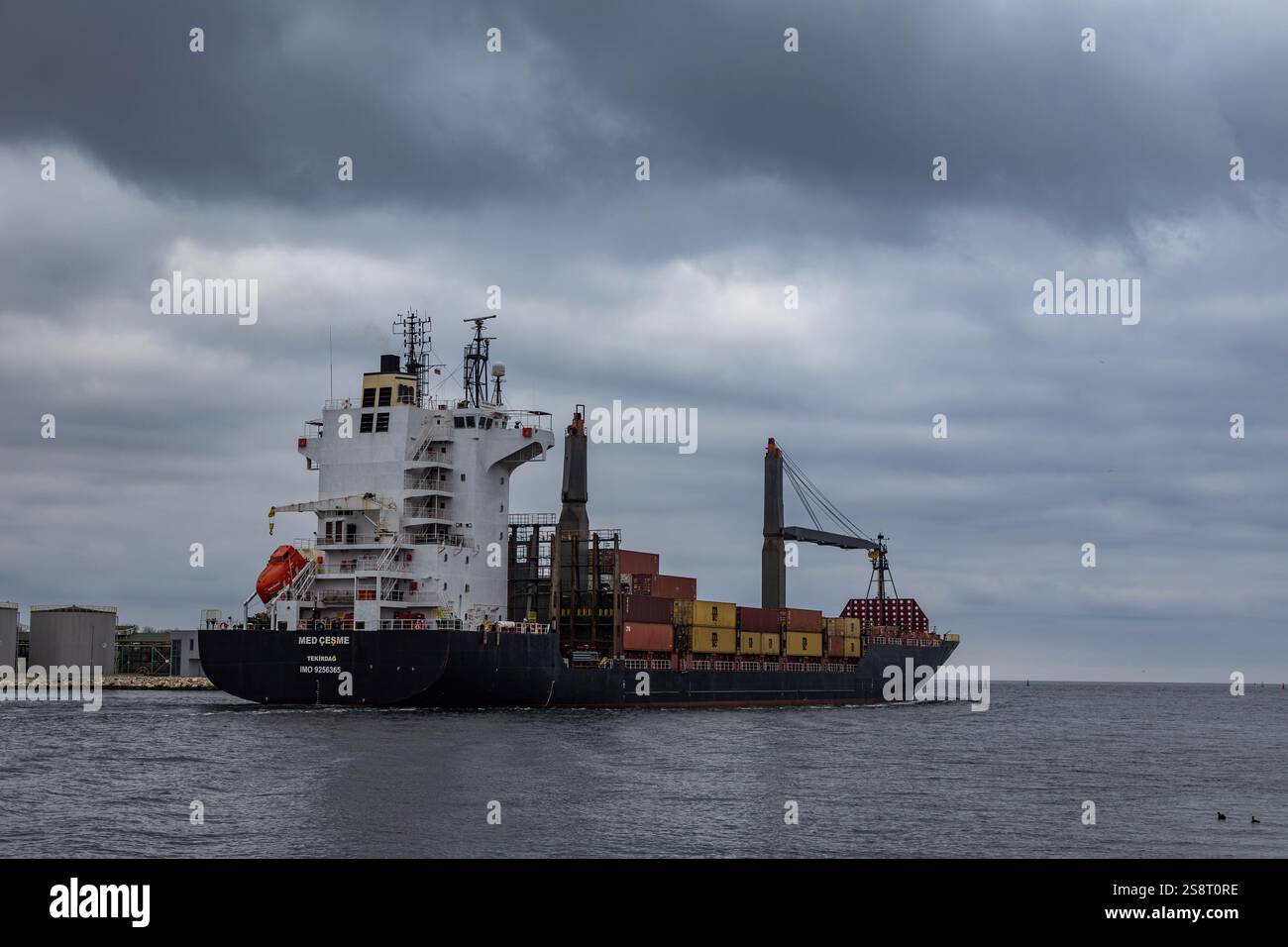 Large Turkish container ship in sea on port of Varna, Bulgaria ...
