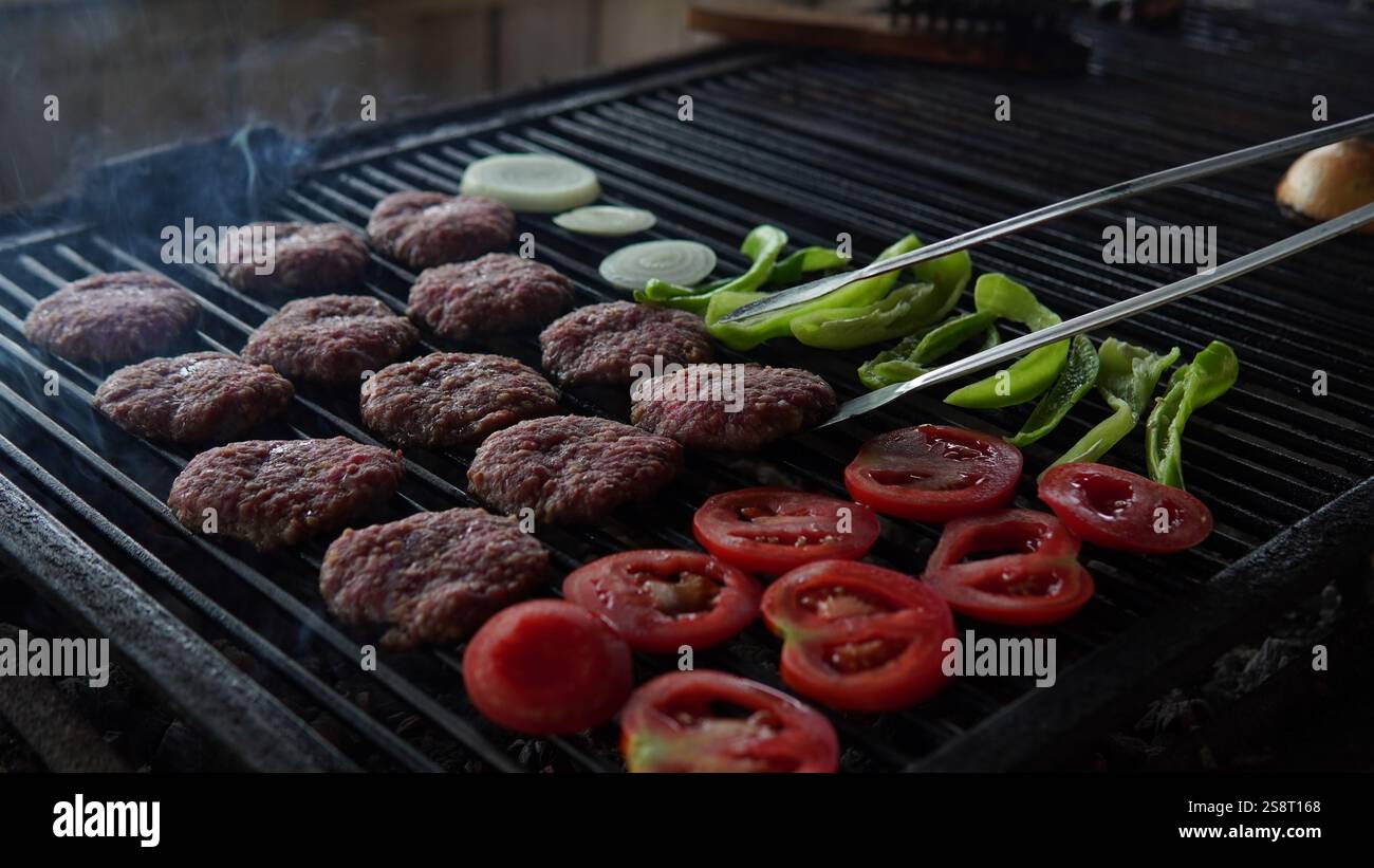 Turkish style barbecue meatballs, meatballs, onion, tomato, green ...
