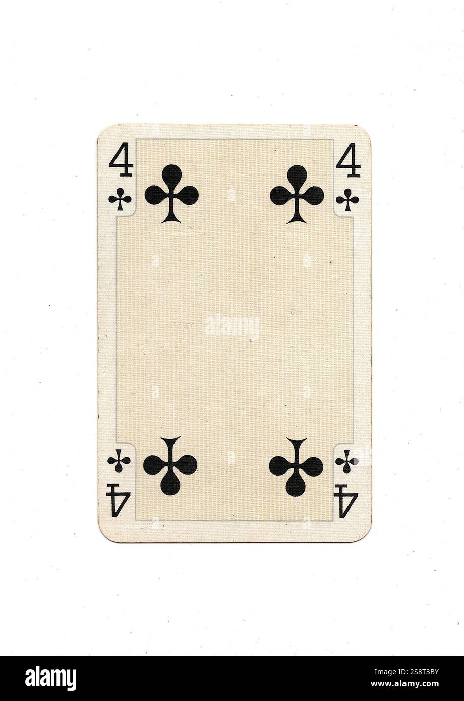 An antique four of clubs playing card isolated on a white background ...