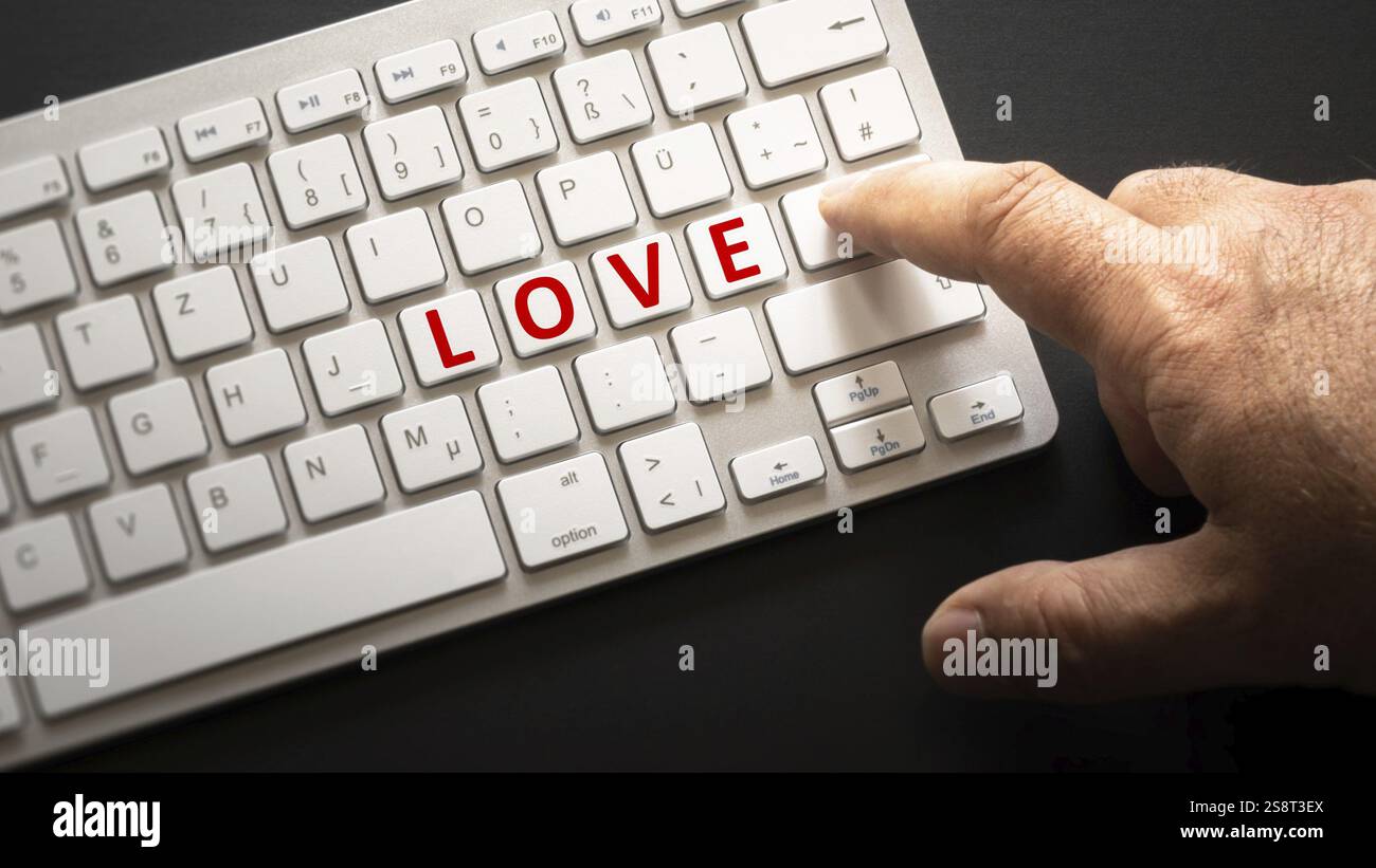 Sending a romantic mail on a keyboard with love letters Stock Photo - Alamy