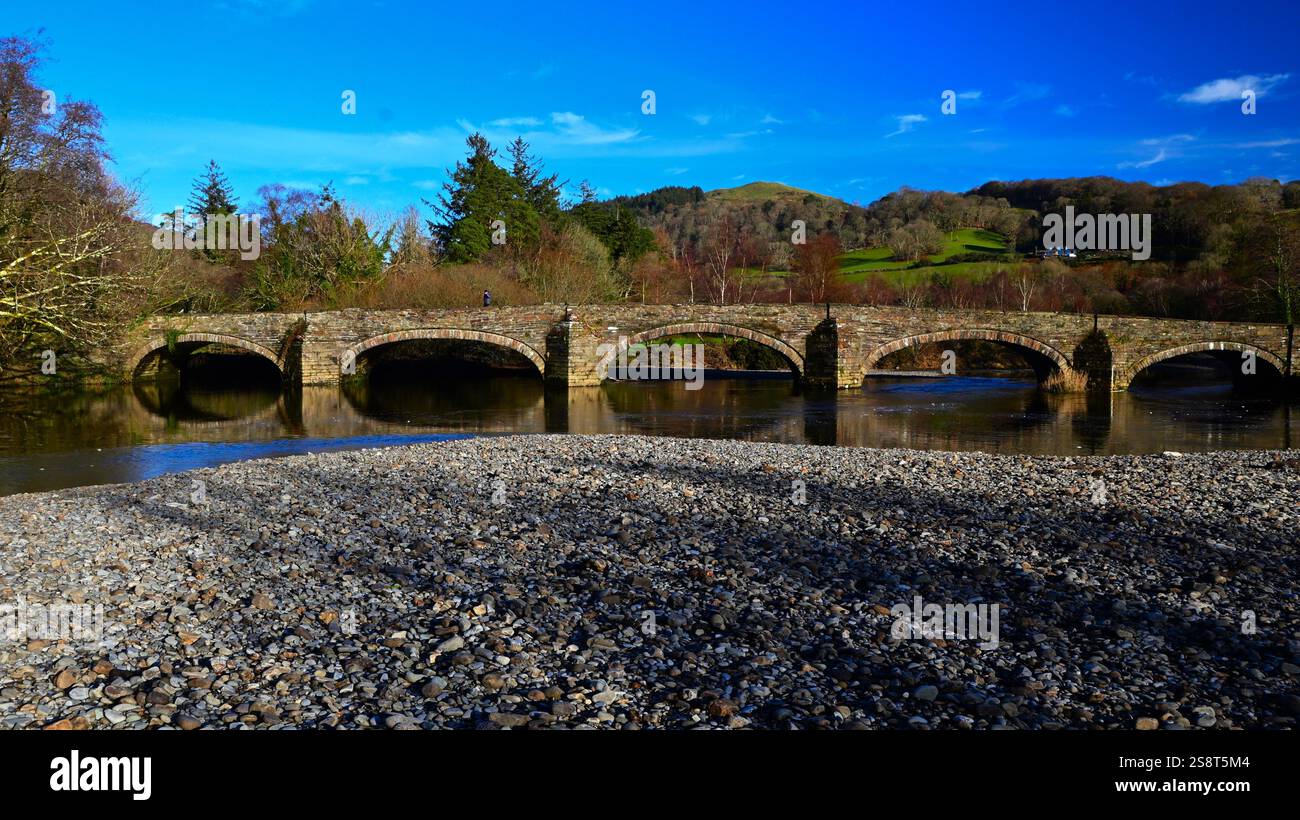 The old stone Llanelltyd road bridge over the Afon Mawddach now closed ...