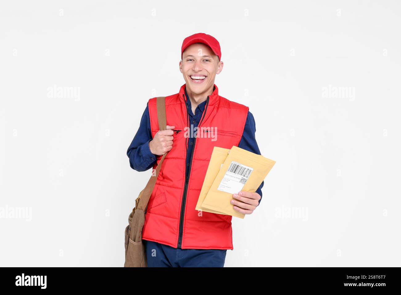 Happy postman with bag and envelopes on white background Stock Photo ...