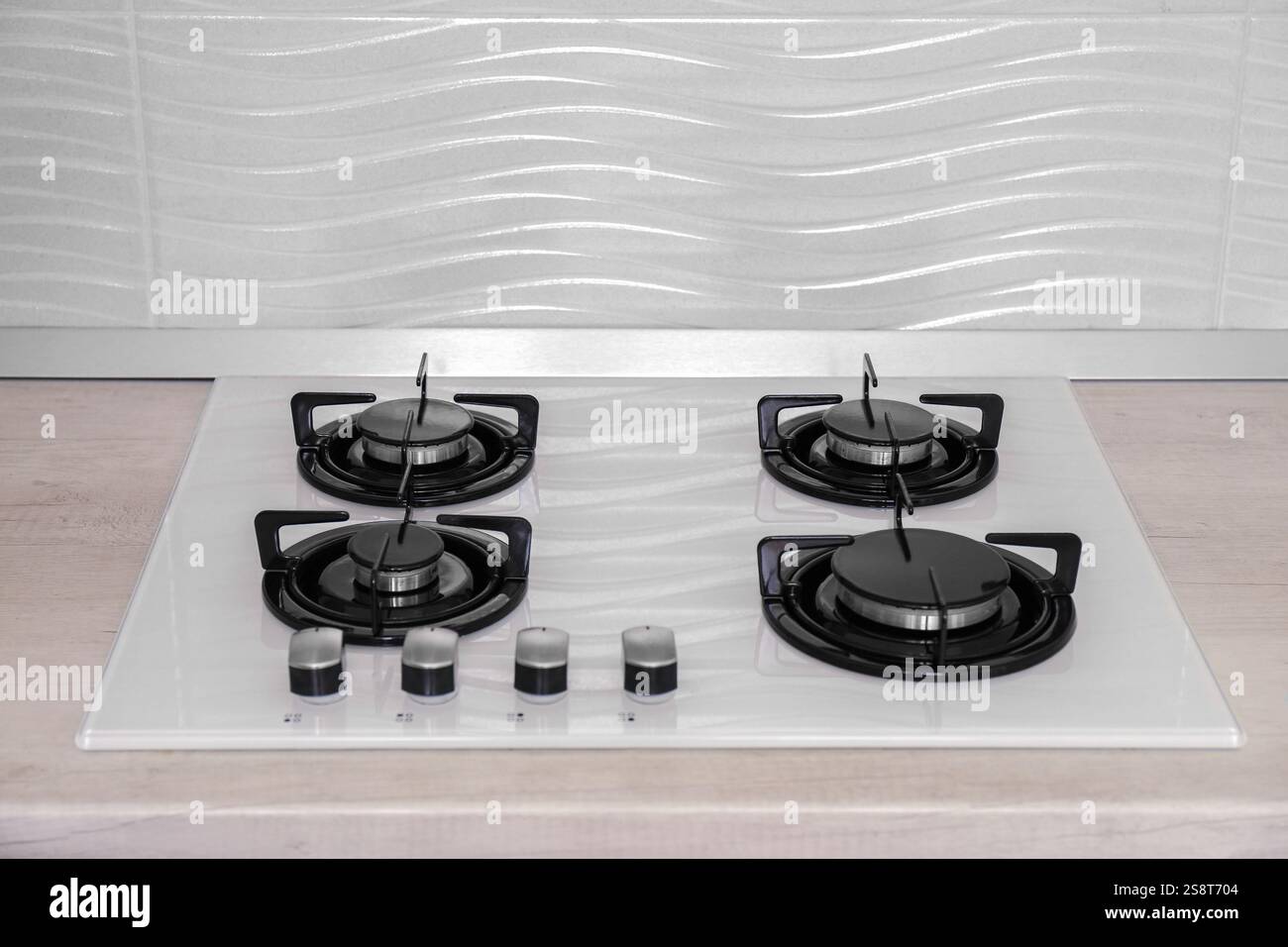 Modern gas hob in kitchen. Domestic appliance Stock Photo - Alamy