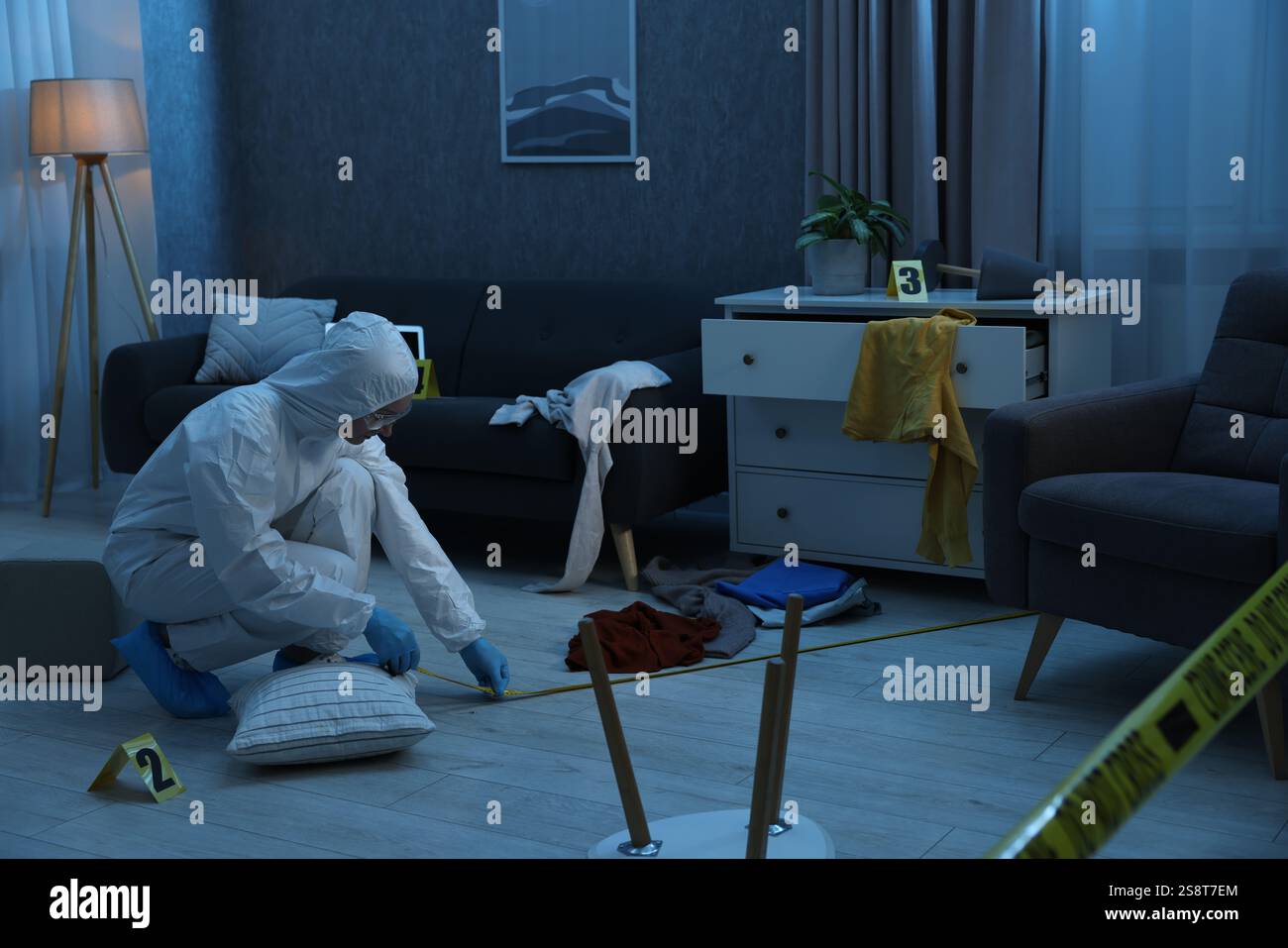 Forensic expert with measuring tape working at crime scene in messy ...