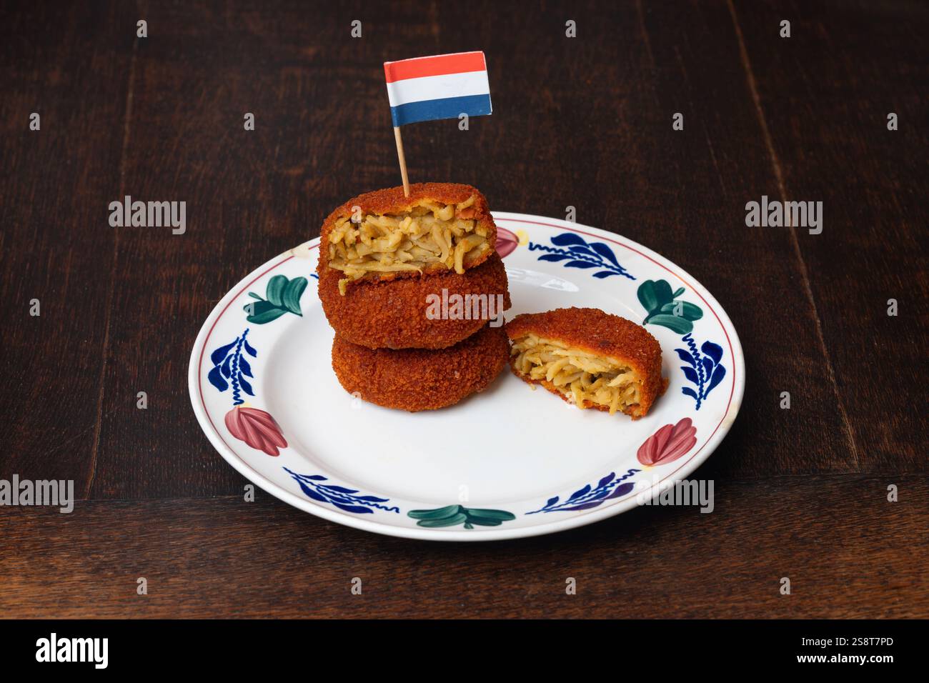 Bamischijf on the plate decorated with dutch flag, dutch snack ...