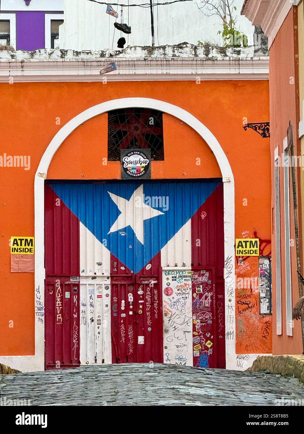 Old San Juan's door with Puerto Rico's flag Stock Photo - Alamy