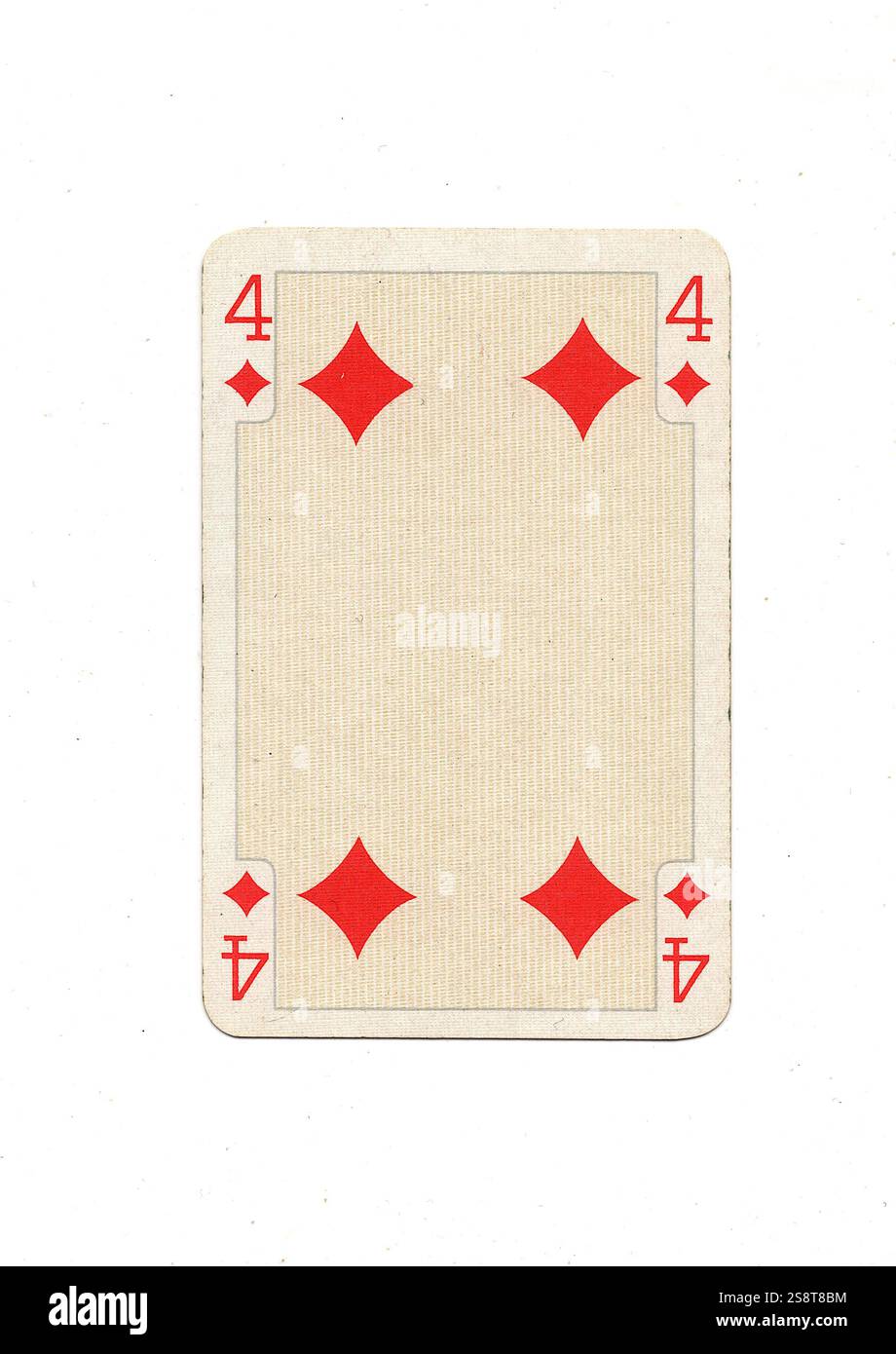 An antique four of diamonds playing card isolated on a white background ...