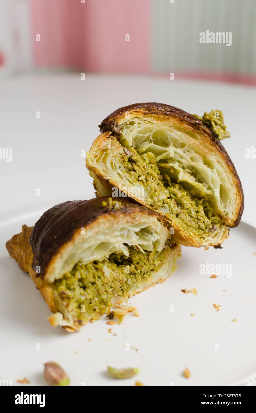Croissant stuffed with pistachio paste and kadaif dough covered with ...