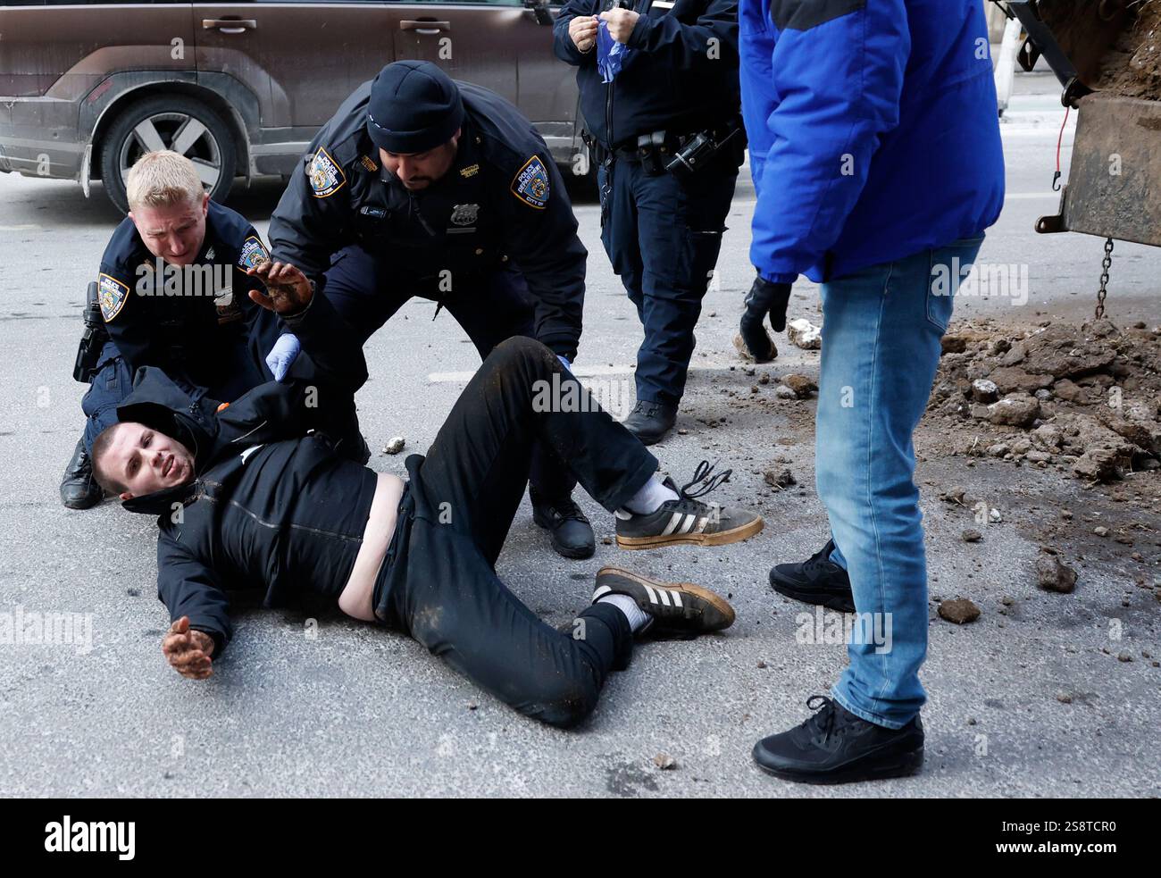 New York, United States. 23rd Jan, 2025. A PETA activist is arrested by ...