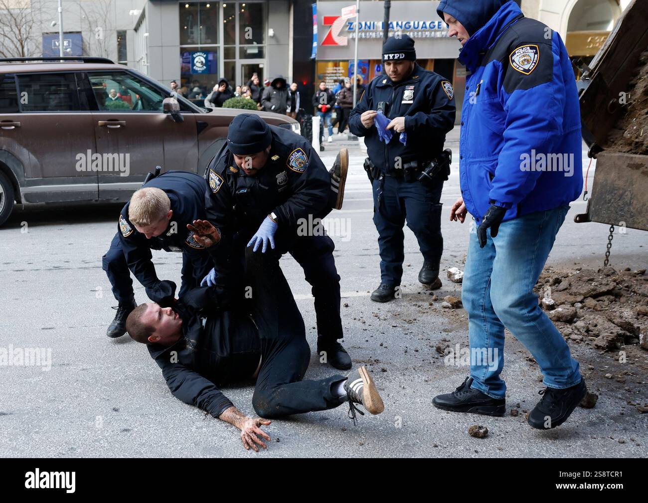 New York, United States. 23rd Jan, 2025. A PETA activist is arrested by ...