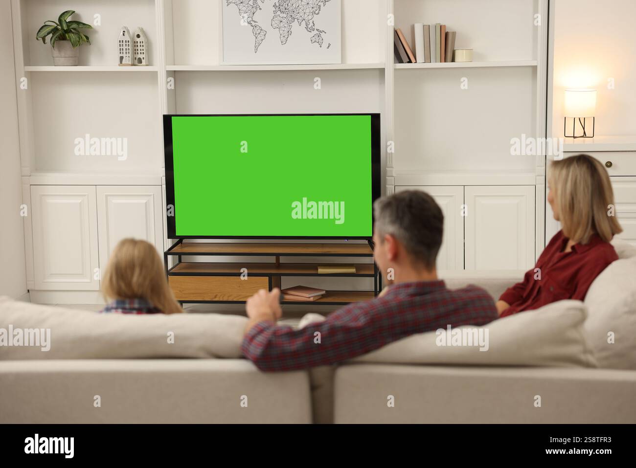 Watching video on chroma key hi-res stock photography and images - Alamy