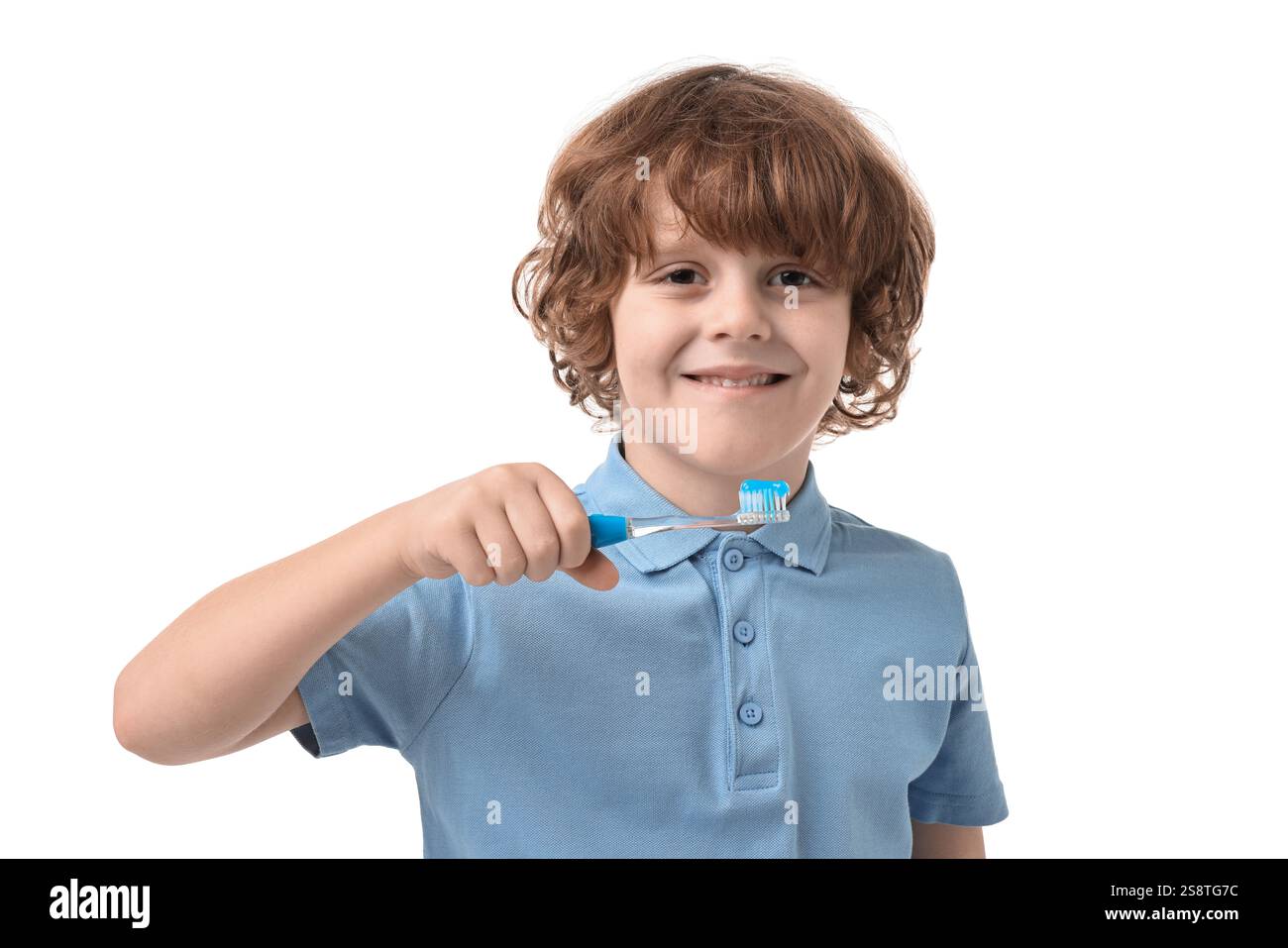 Cute boy with toothbrush and toothpaste on white background Stock Photo ...