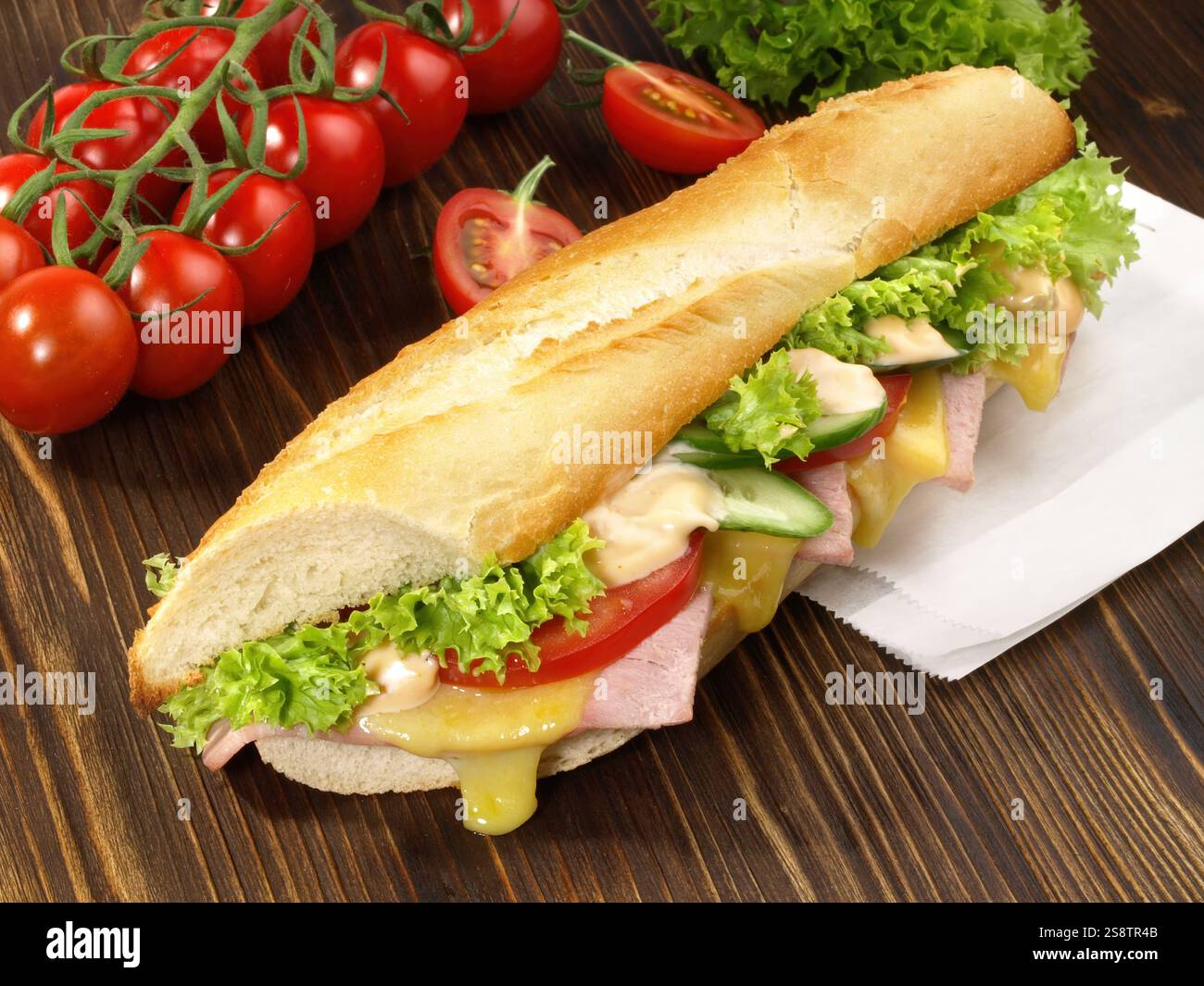 French Baguette with Ham and Cheese Stock Photo - Alamy