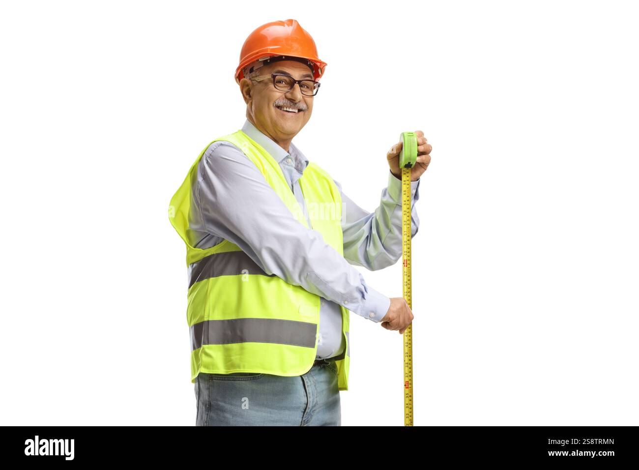 Mature male engineer using a steel tape measure isolated on white ...