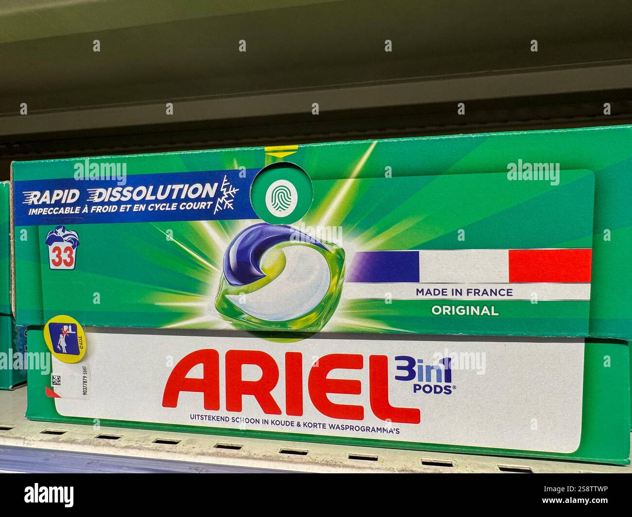 Brightly packaged laundry pods sitting on a grocery store shelf Stock ...