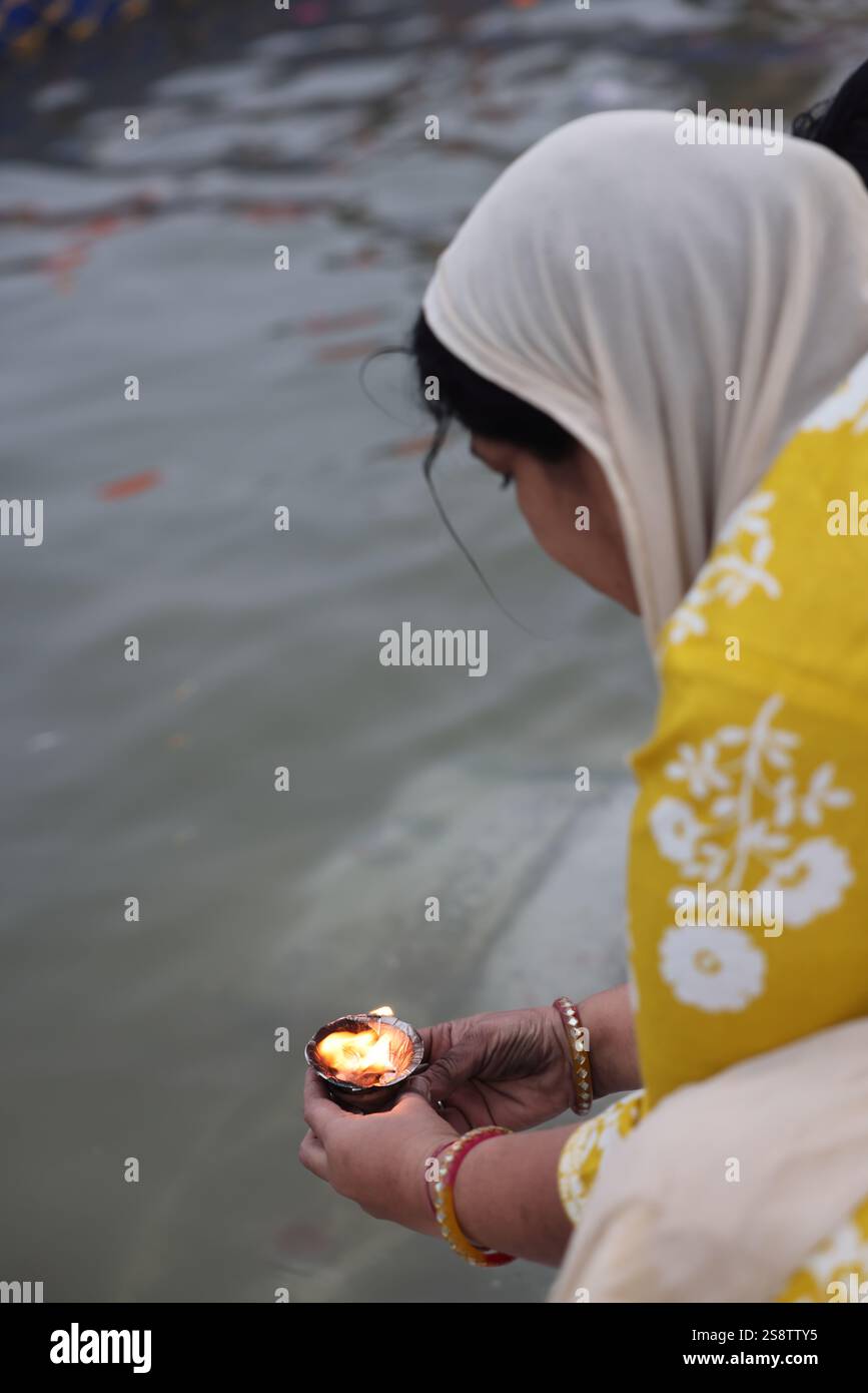 Pilgrim before bathing at the Triveni Sangam on the Paush Purnima, Maha ...