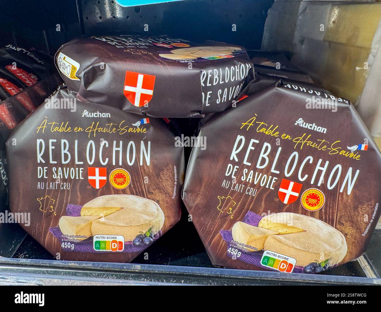 Discovering the rich flavors of Reblochon cheese in a French market ...