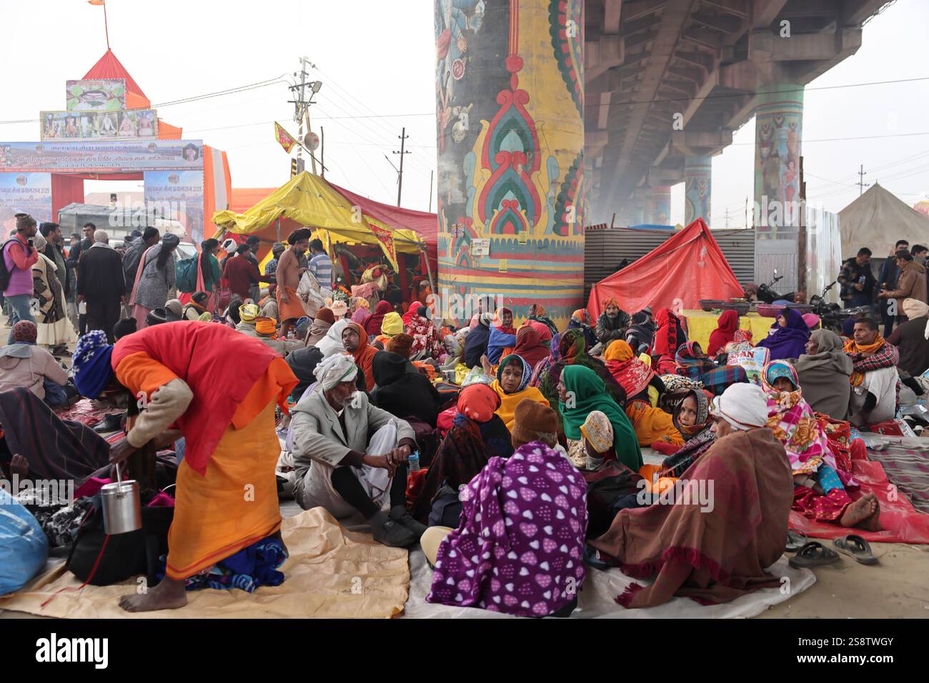 Pilgrims under the Shastri bridge during the Maha Kumbh Mela, Prayagraj ...