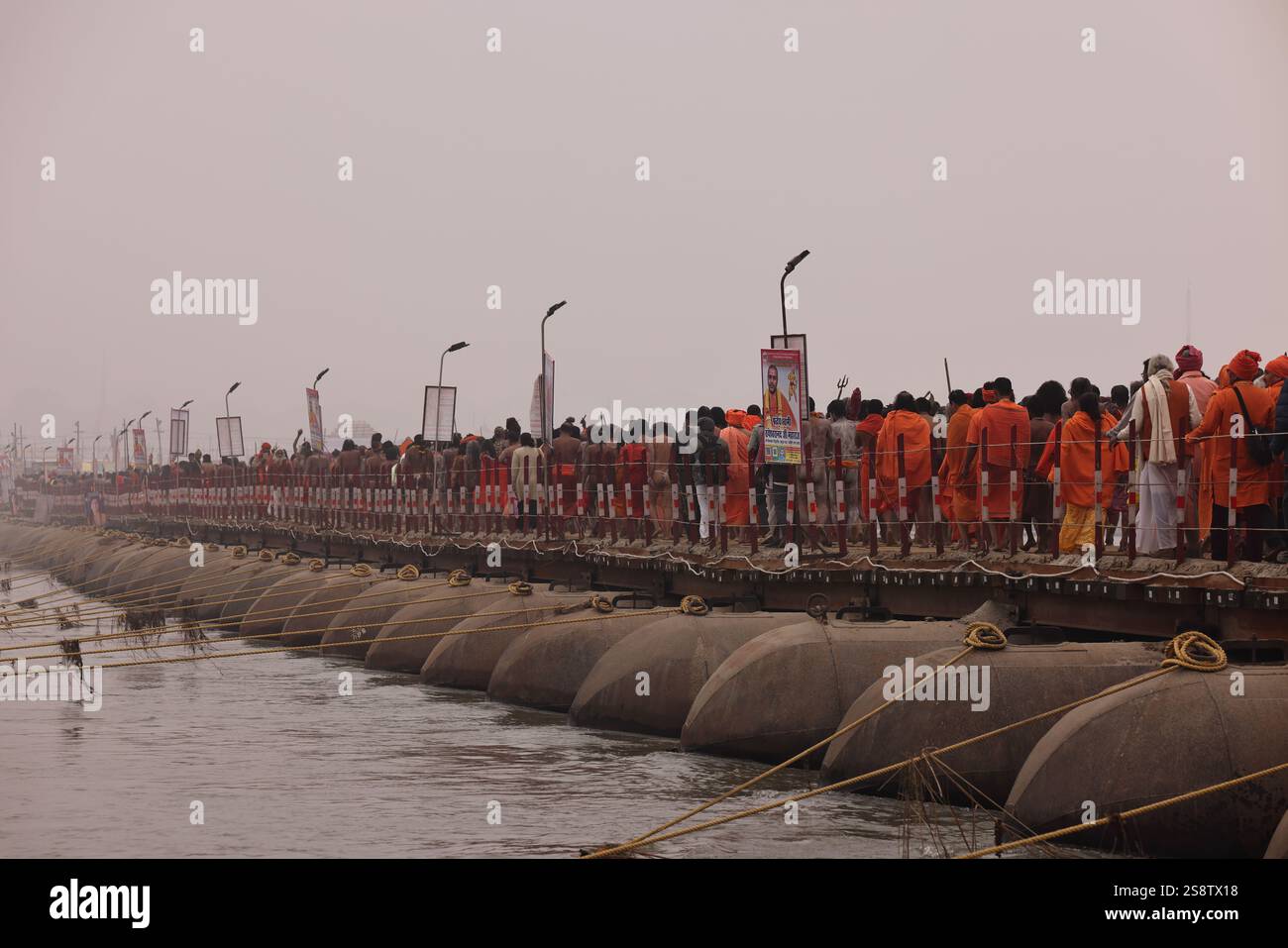 Naga Sadhus parading across pontoon bridge, Shahi Snan, Maha Kumbh Mela ...