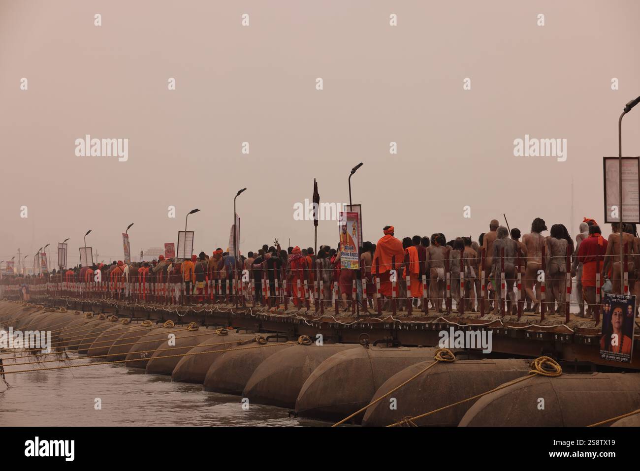 Naga Sadhus parading across pontoon bridge, Shahi Snan, Maha Kumbh Mela ...
