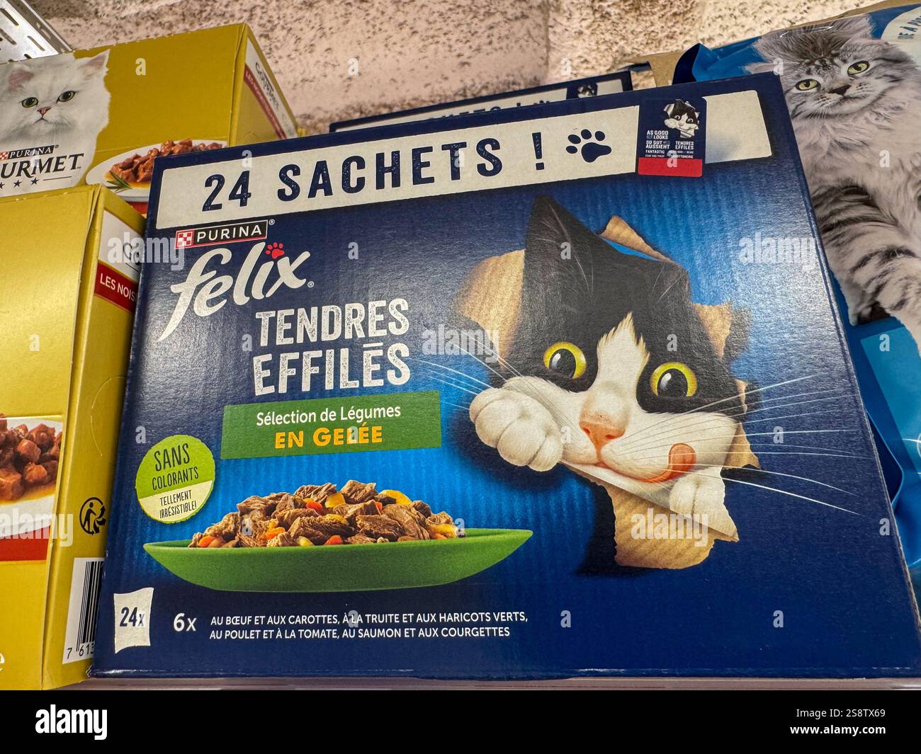 Cat-themed packaging showcases gourmet meal pouches for pets in store ...
