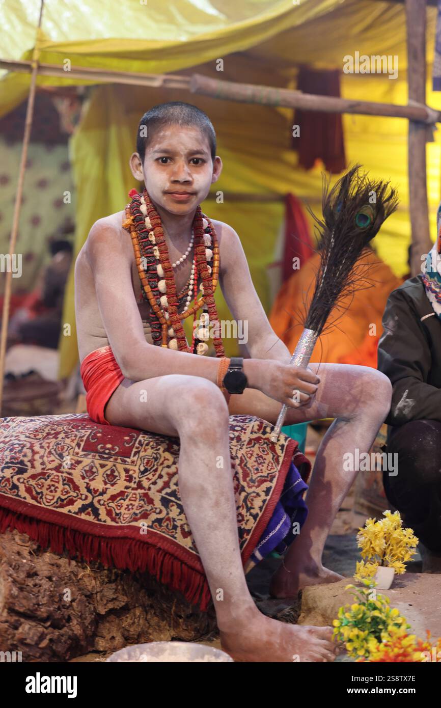 Young boy naga sadhu in an akhara, Maha Kumbh Mela, Prayagraj, Uttar ...