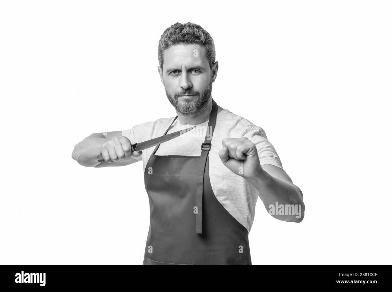 butcher in red apron hold knife isolated on white background Stock ...