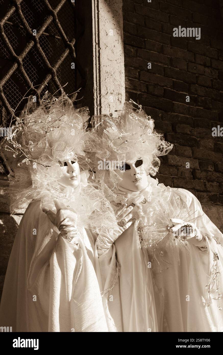 Valentine day in Venice. Two fluffy white masks in St Mark's Square ...