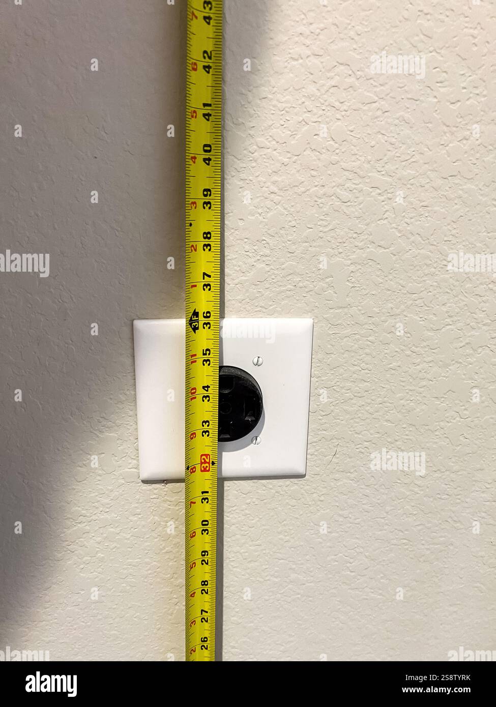Measurement of Dryer Outlet in Laundry Room Stock Photo - Alamy