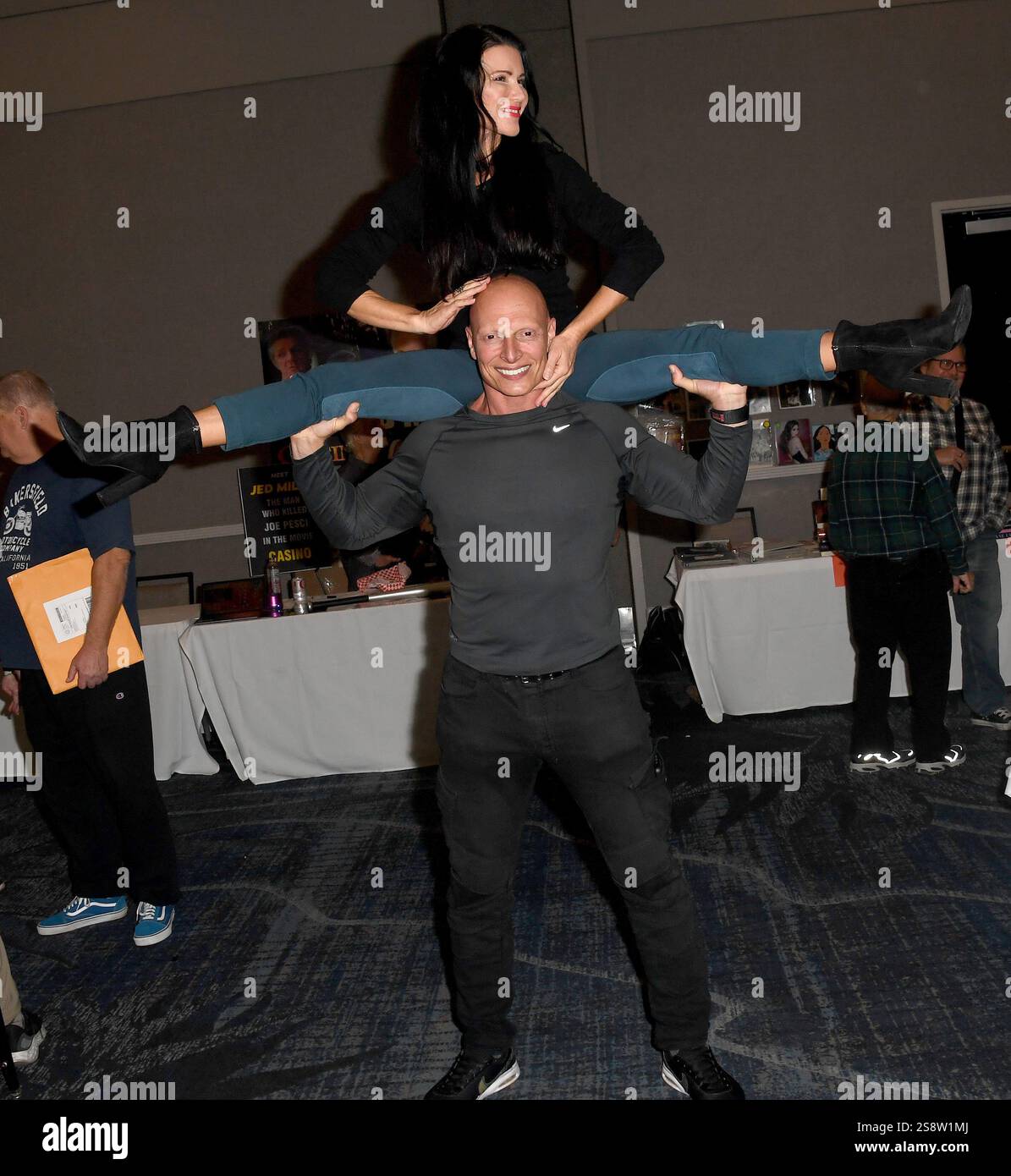 Actors Mercy Malick and Joseph Gatt perform an acrobatic act at the ...