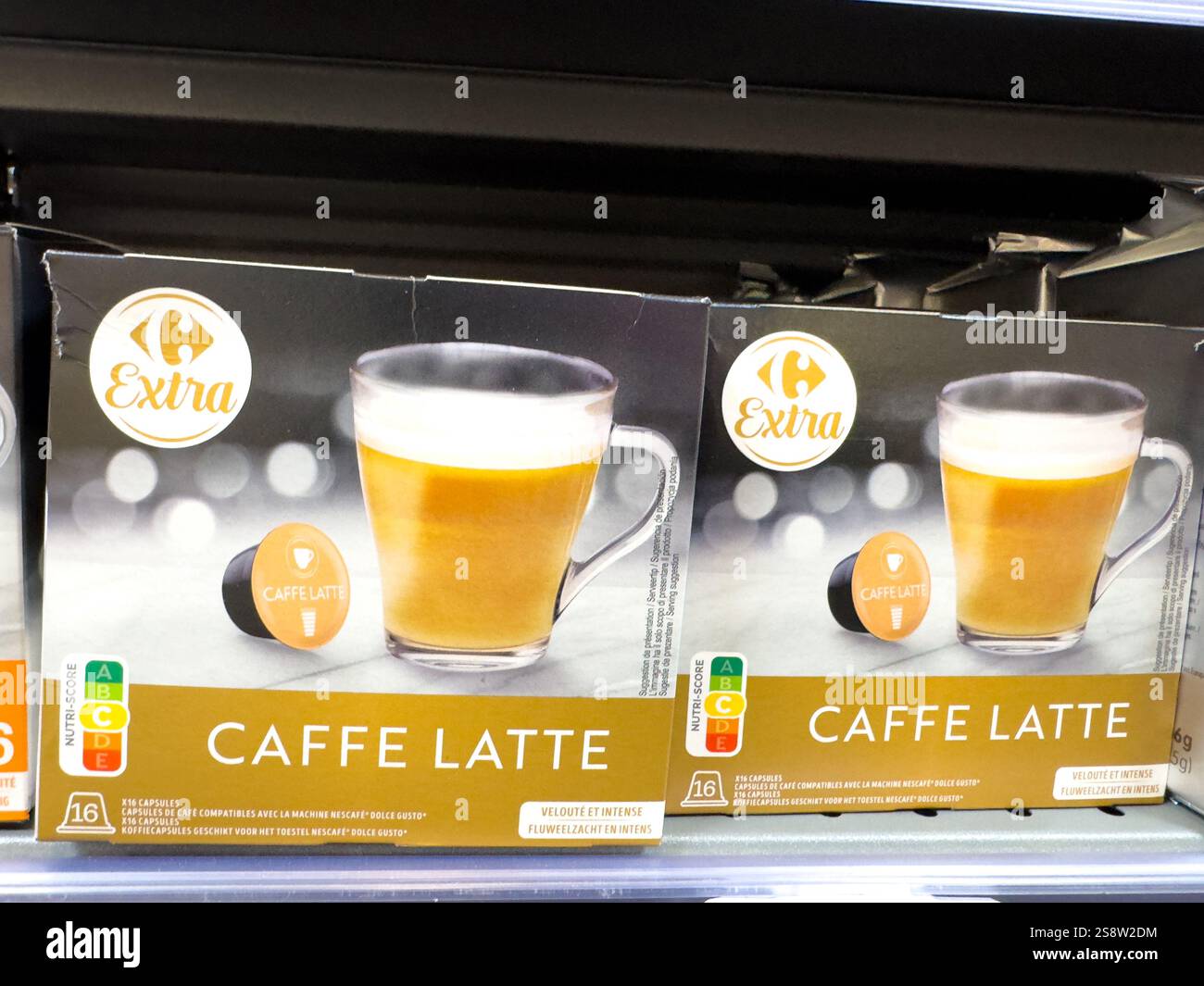 Caffe latte pods displayed on supermarket shelf during a shopping trip ...