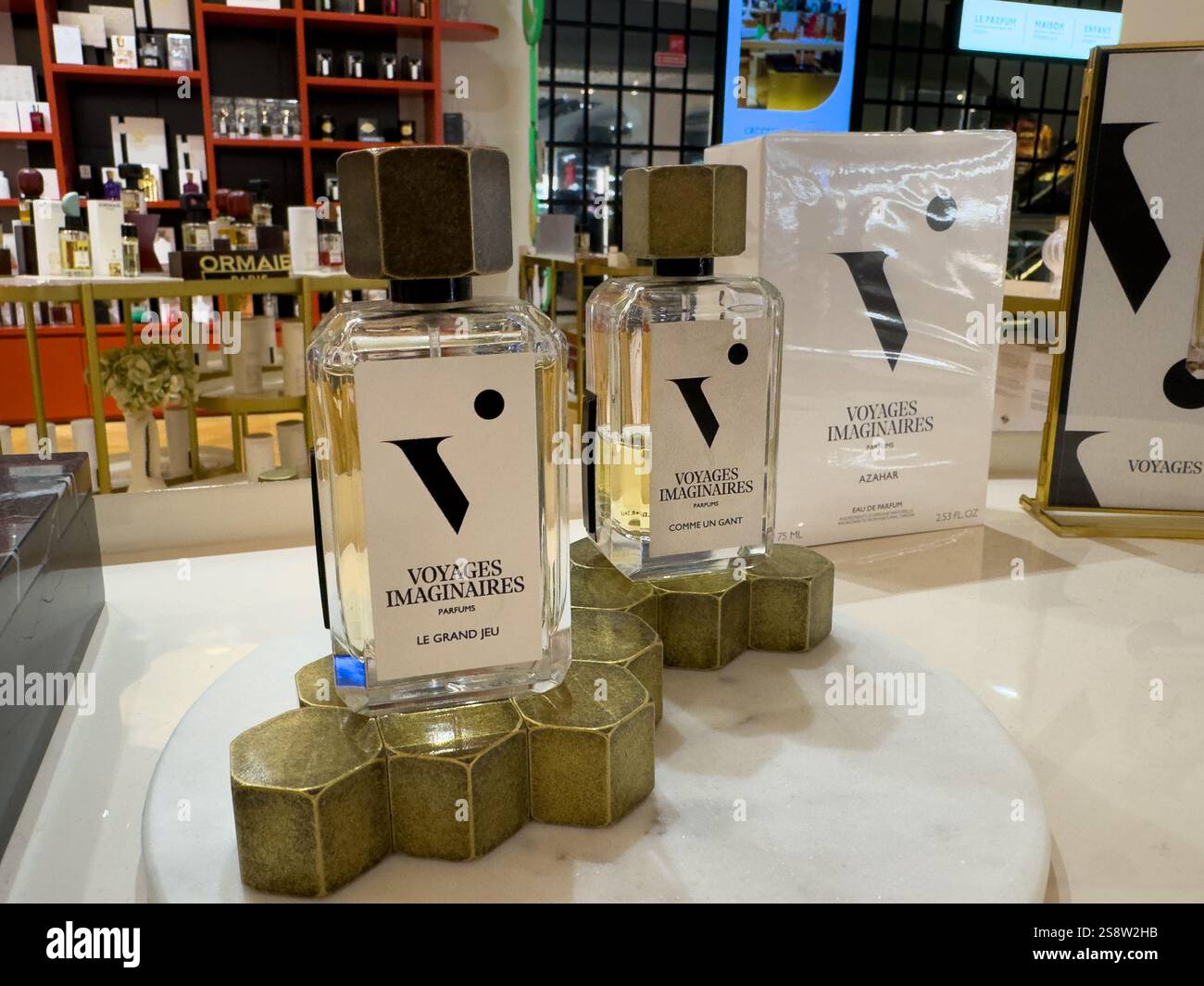 Luxury fragrance display in a modern retail store in the evening Stock ...
