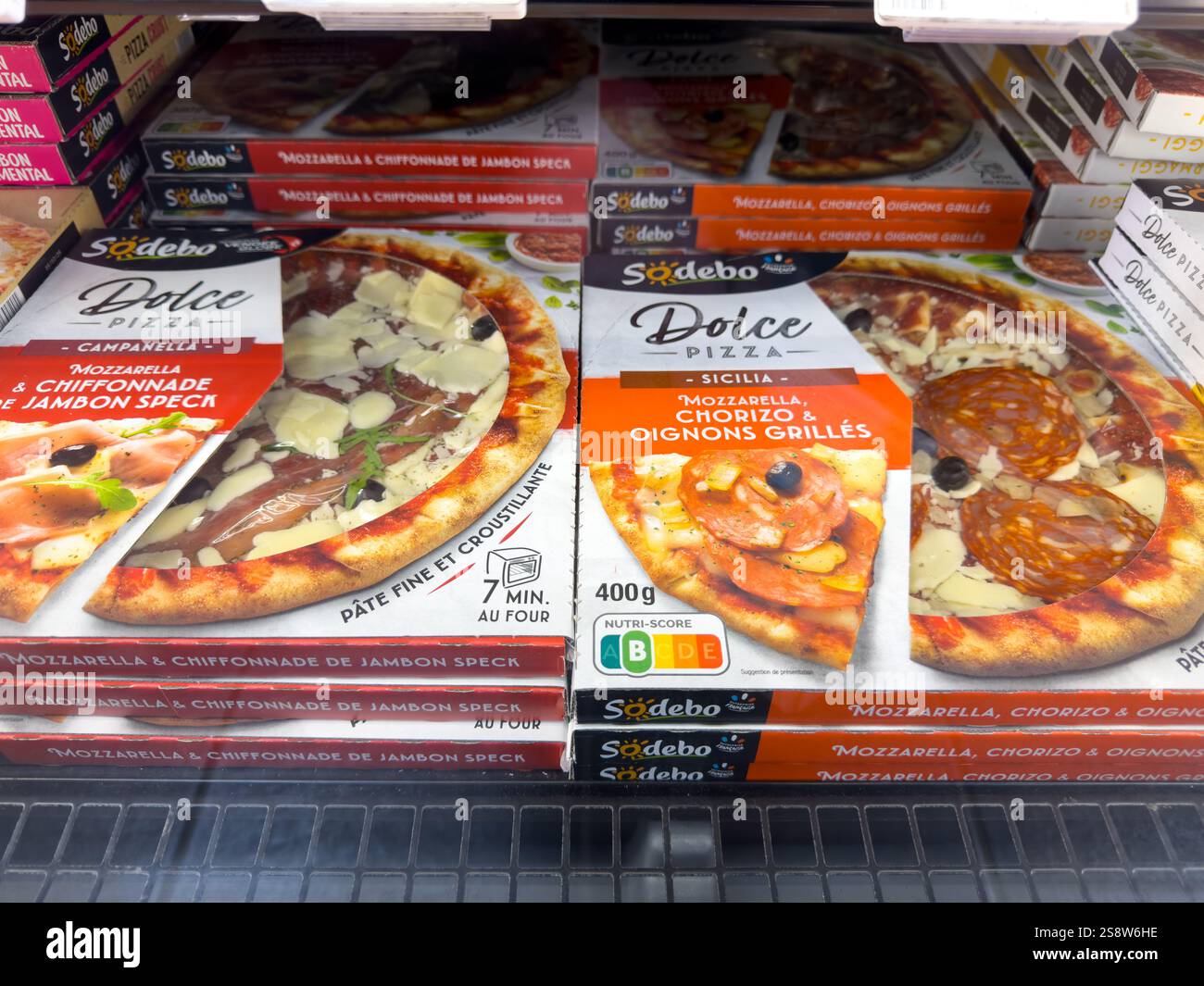 Frozen pizzas in the supermarket freezer this afternoon Stock Photo - Alamy