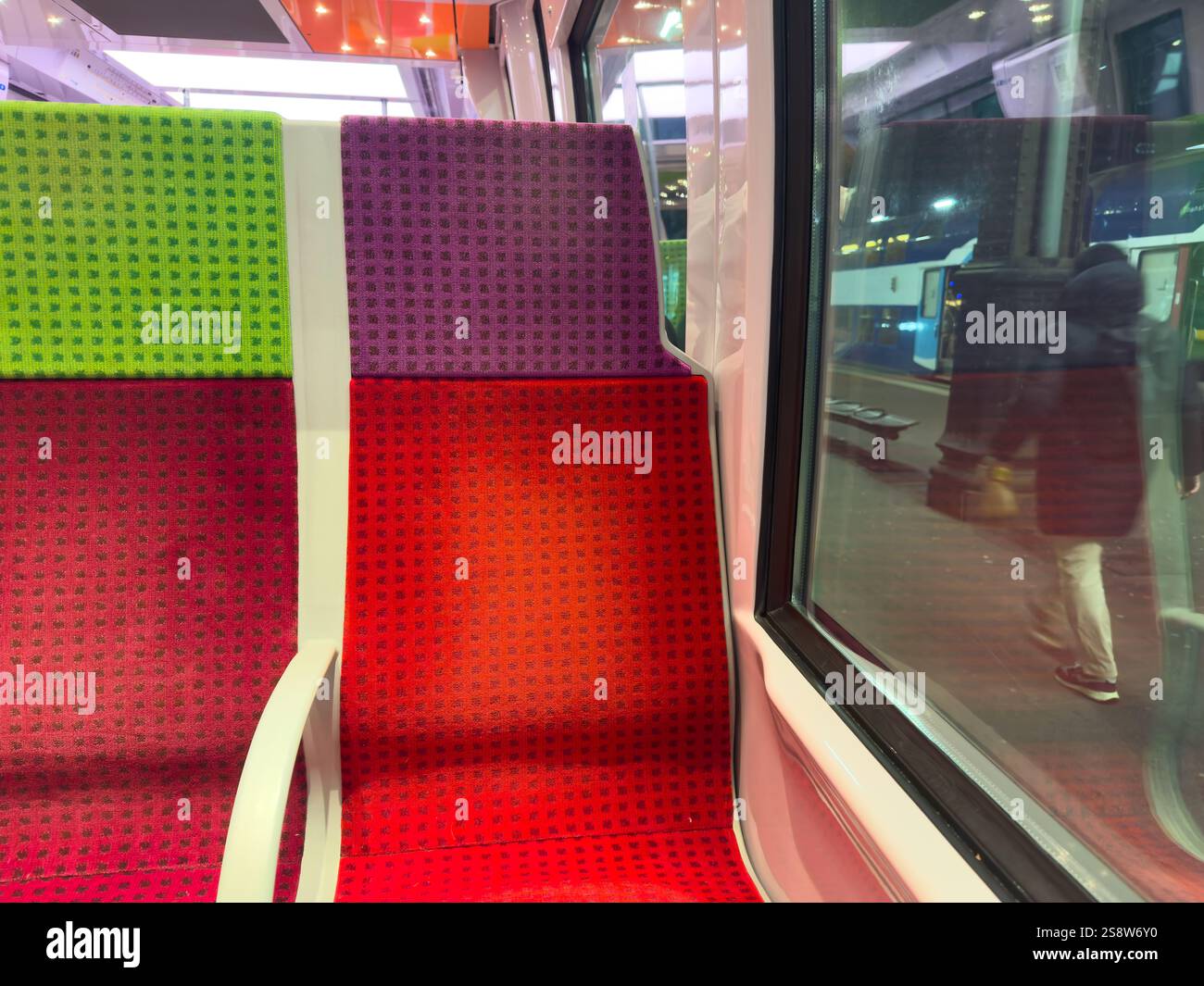 Colorful seating inside a modern transportation system at night Stock ...