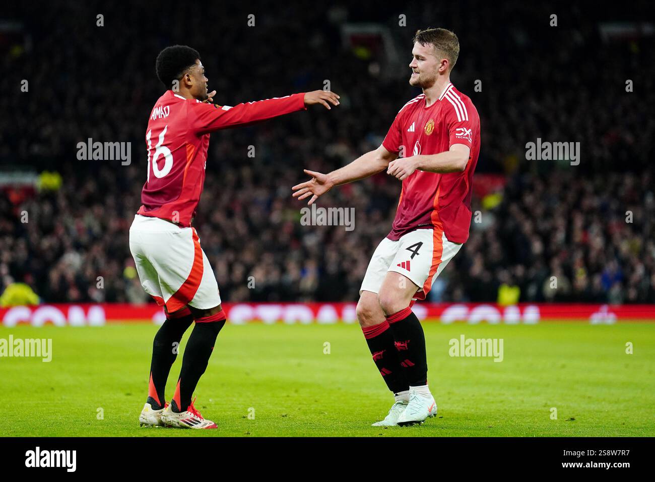 Manchester United's Matthijs de Ligt (right) celebrates scoring only ...