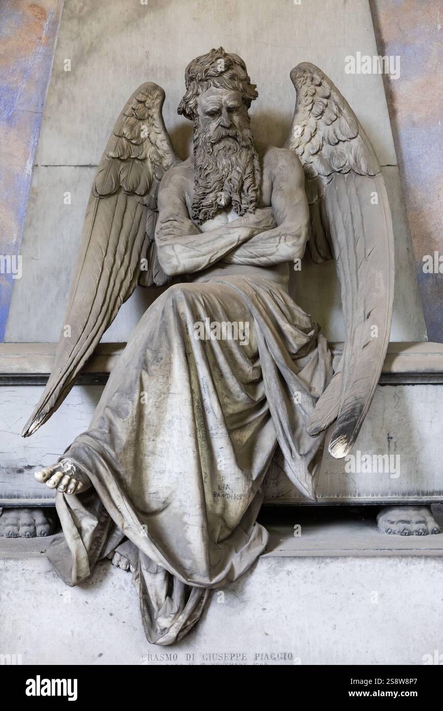 Old angel statue sitting on a tomb in contemplation. Memory and ...