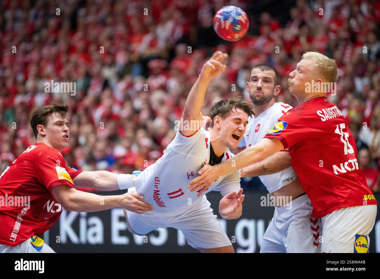 Switzerland's Felix Aellen, center, challenged by Denmark's Magnus ...