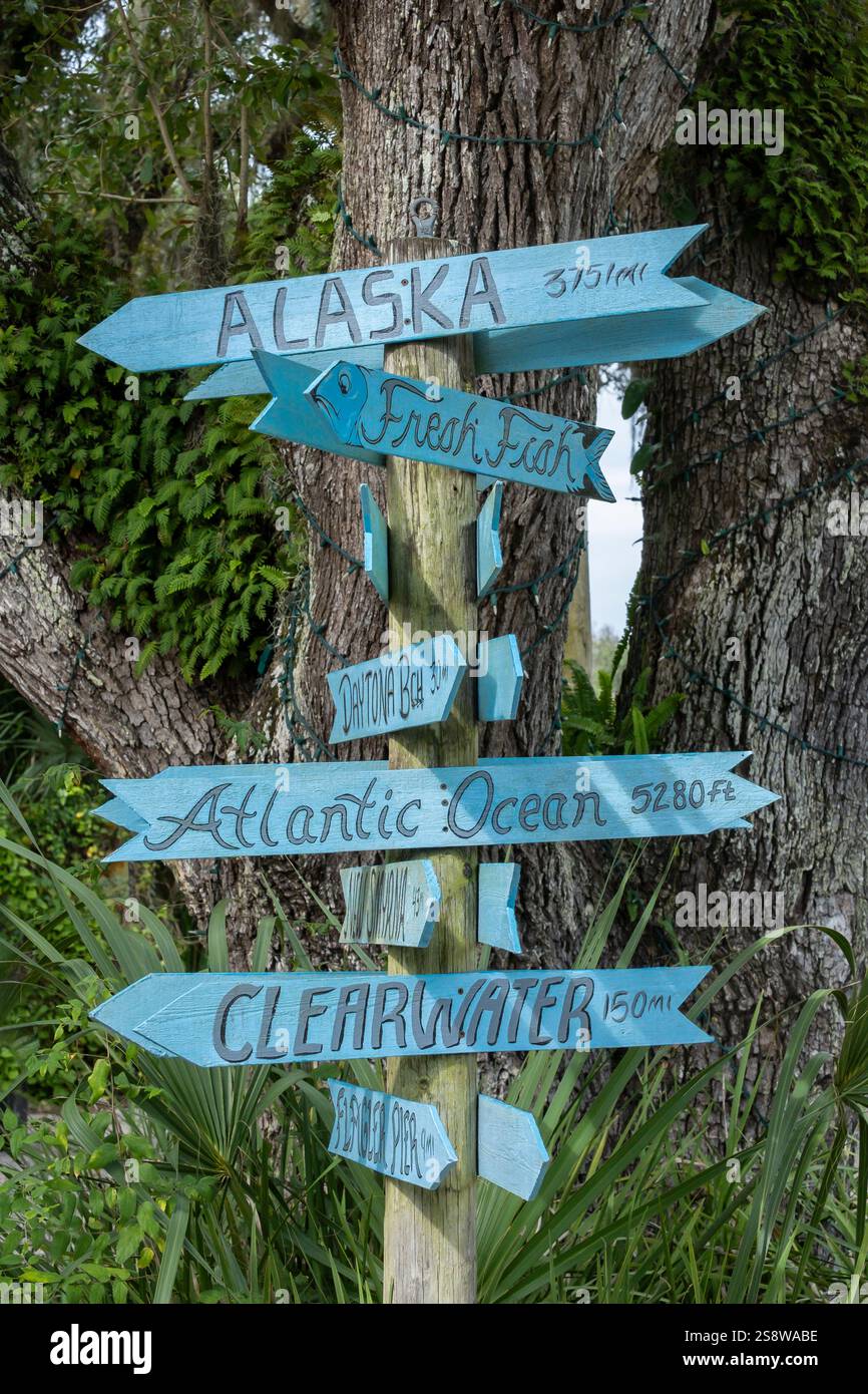 Hand painted directional sign, Palm Coast, Florida Stock Photo - Alamy