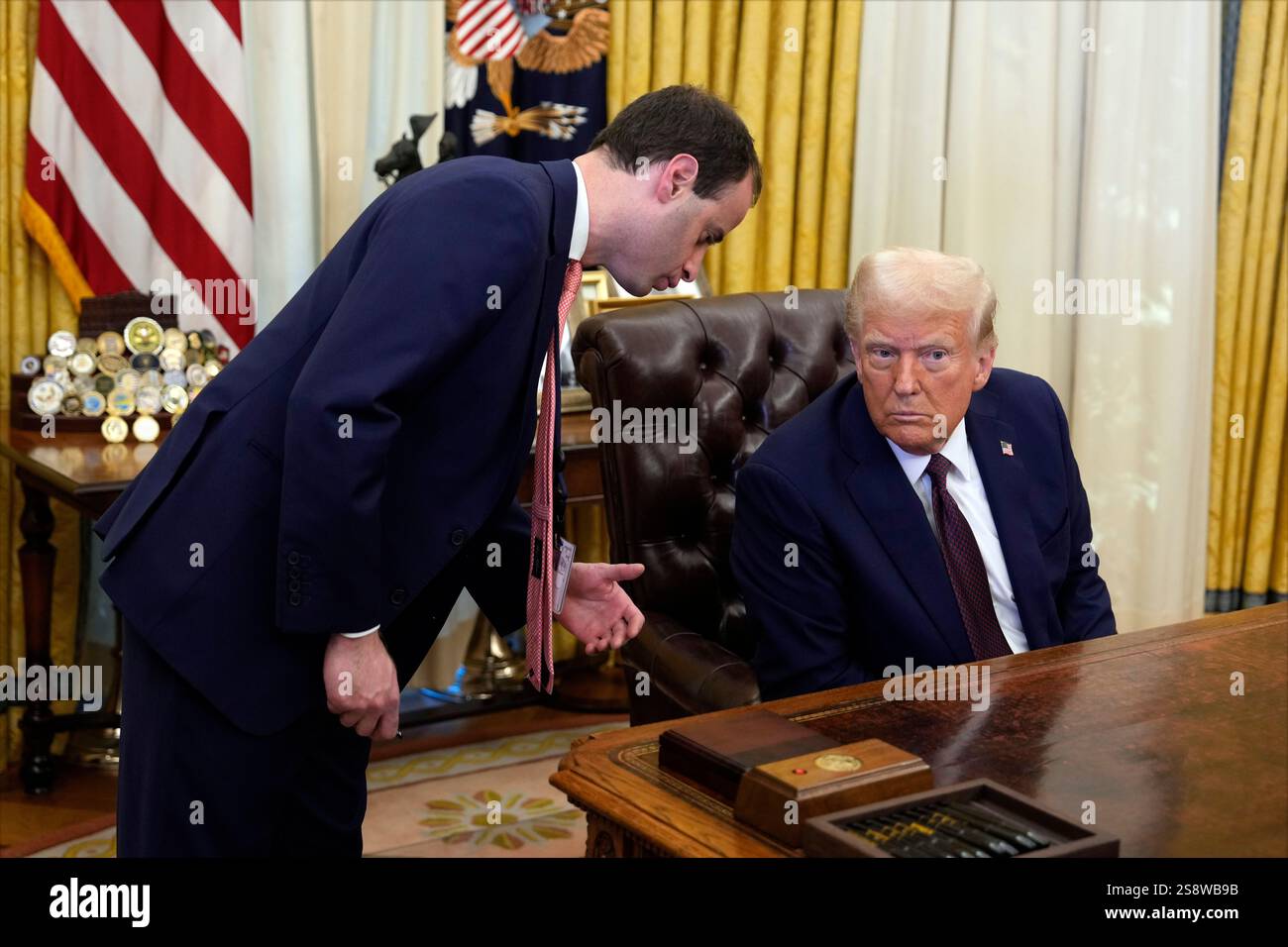 White House staff secretary Will Scharf talks with President Donald ...