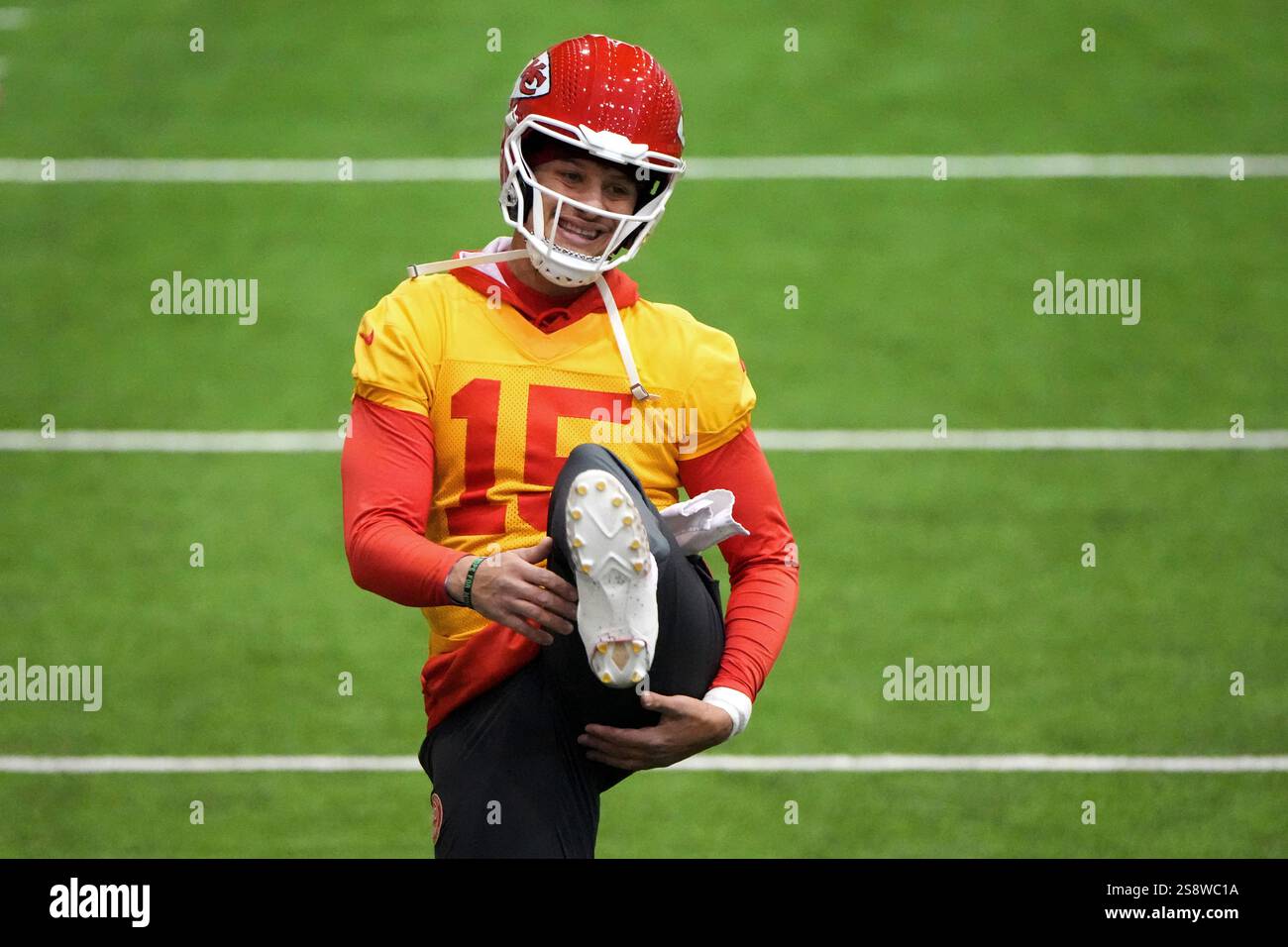 Kansas City Chiefs quarterback Patrick Mahomes stretches during the ...