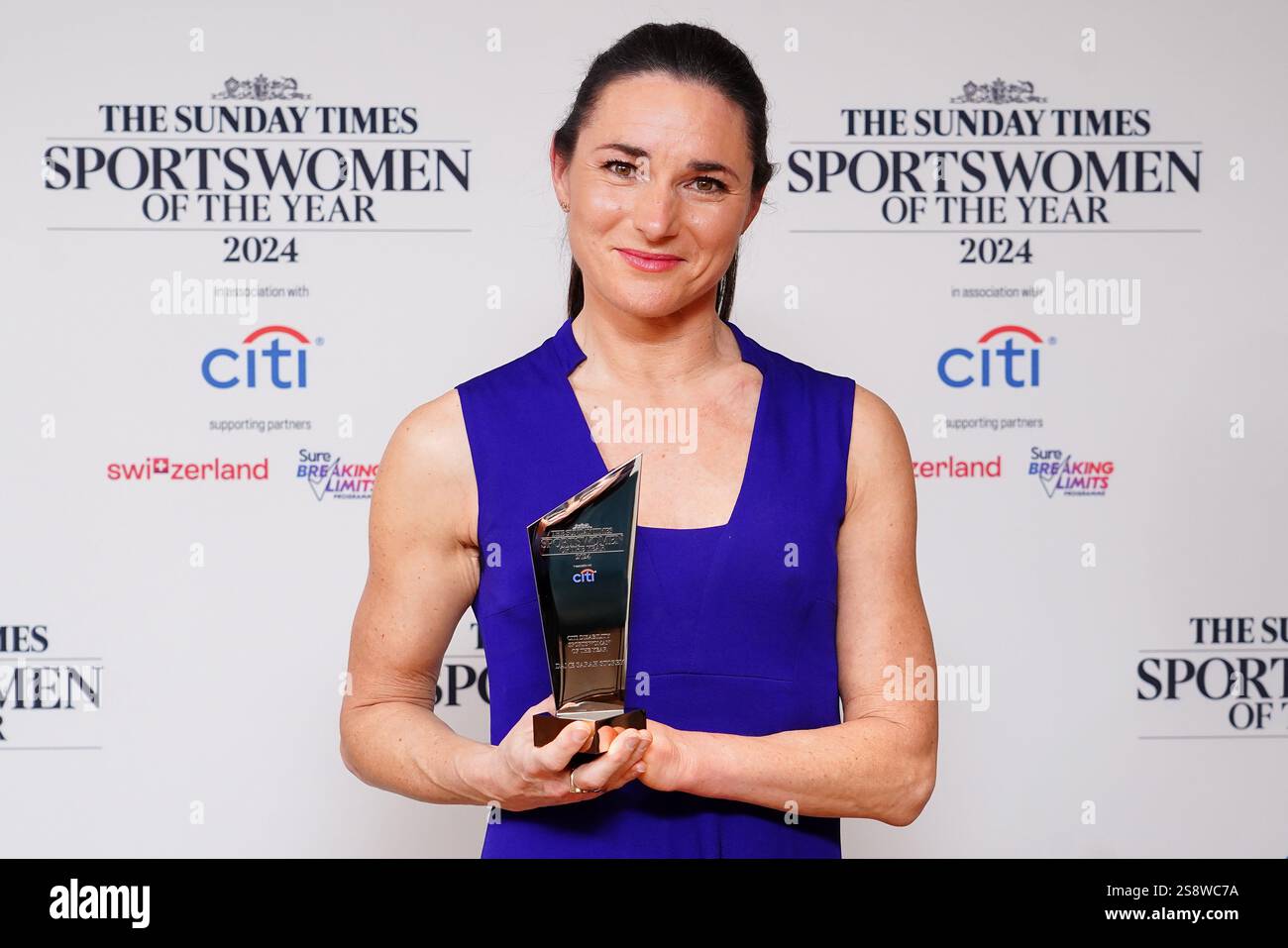 Dame Sarah Storey holding their award for Citi Disability Sportswoman ...