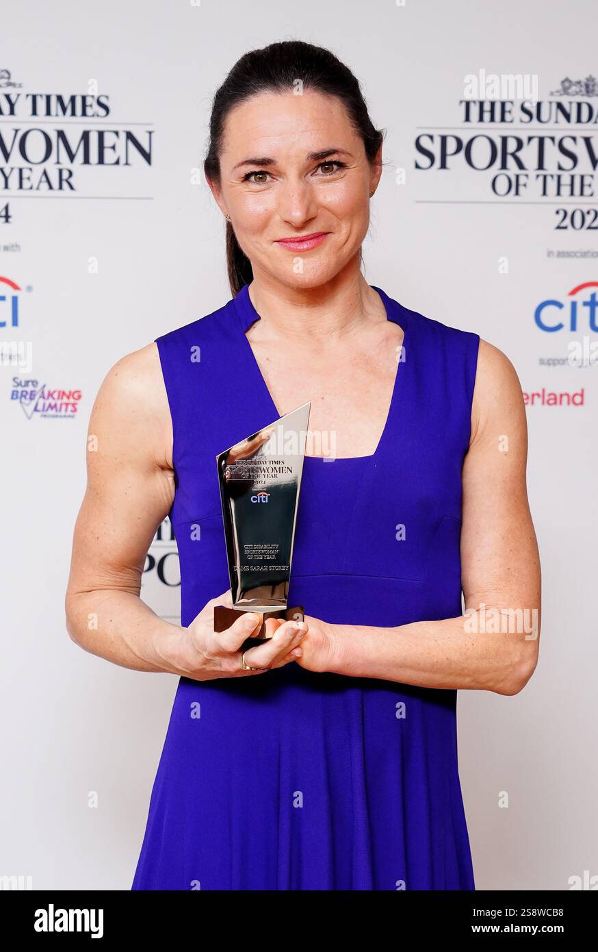 Dame Sarah Storey holding their award for Citi Disability Sportswoman ...