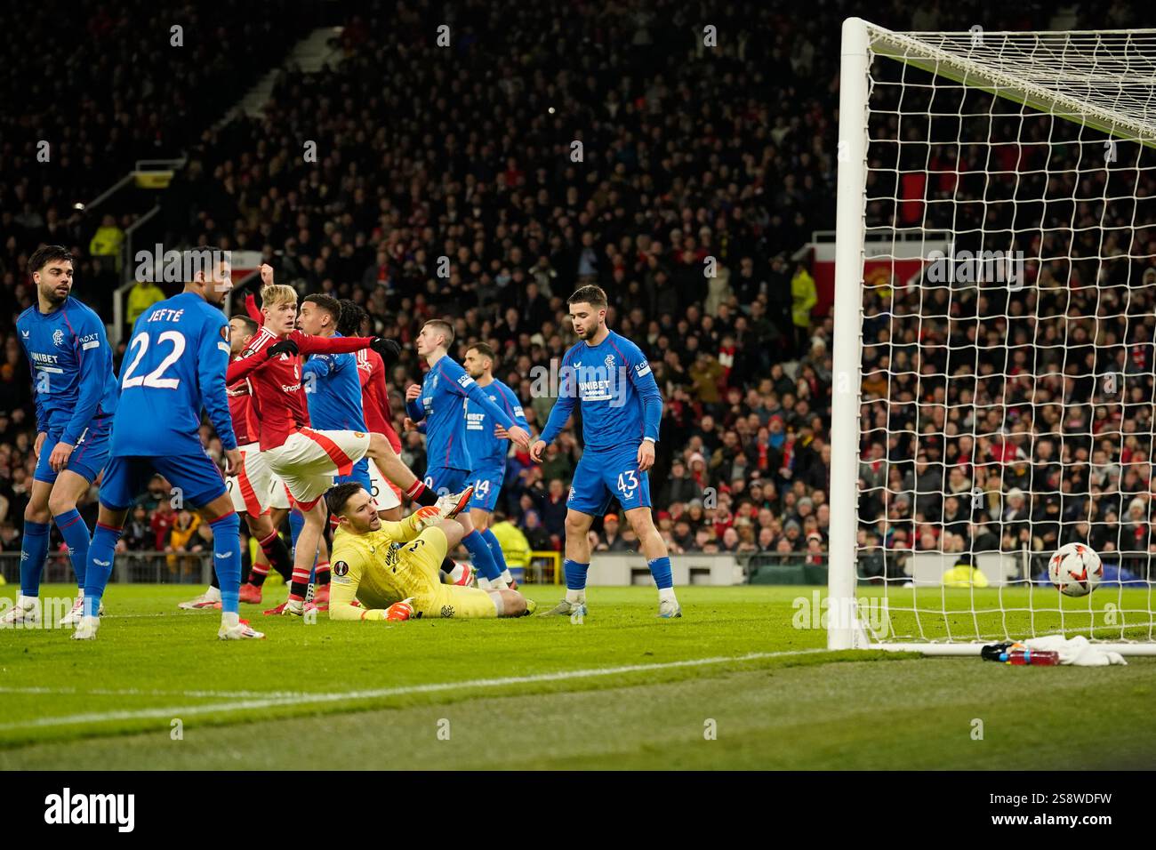Rangers' goalkeeper Jack Butland, centre bottom, scores an own goal ...