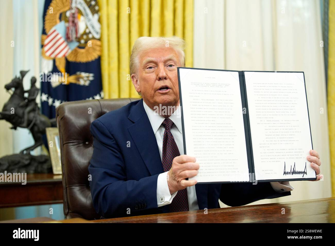 Washington, United States. 23rd Jan, 2025. President Donald Trump signs ...