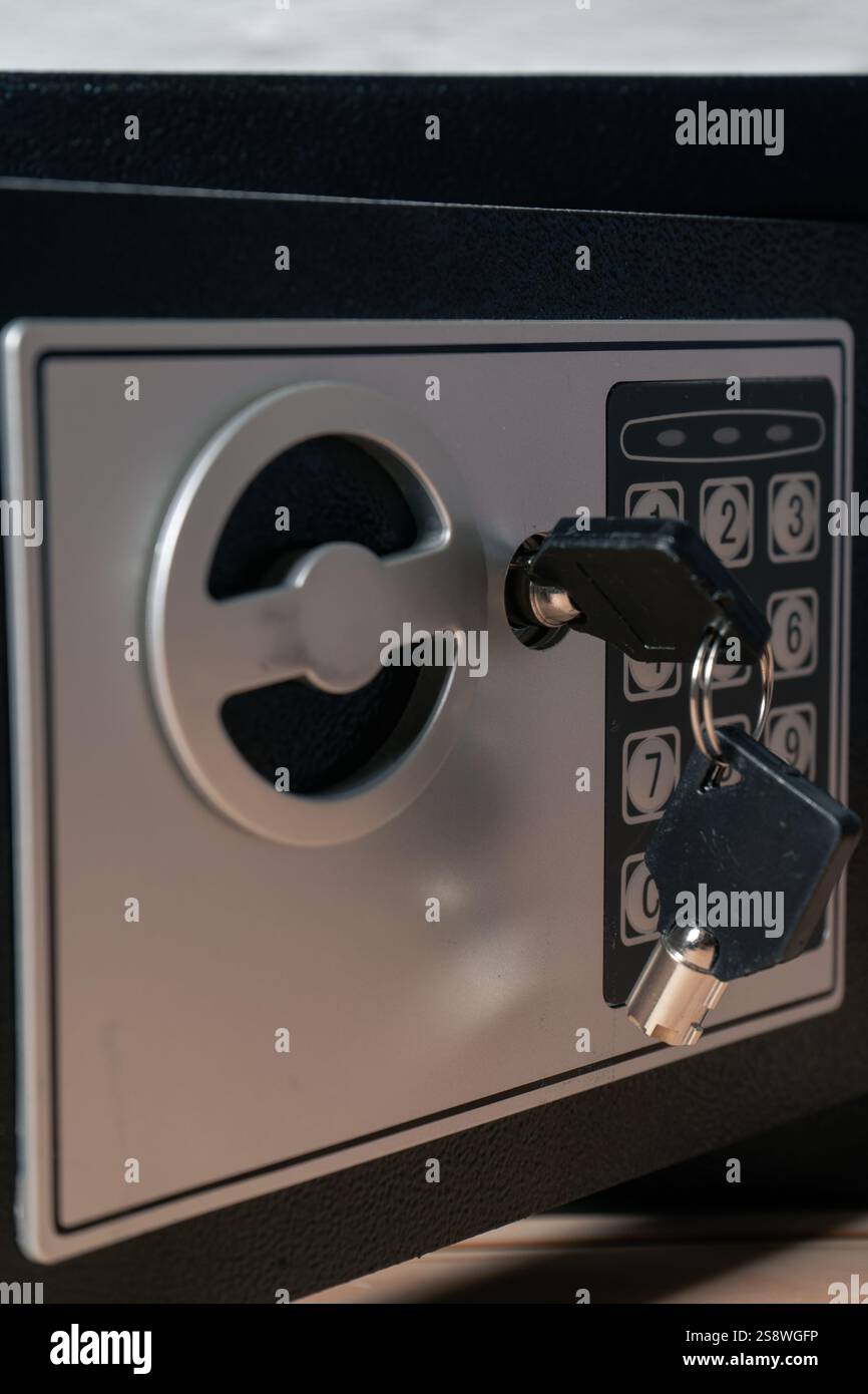 Safe or home security box with key and digital keypad Stock Photo - Alamy