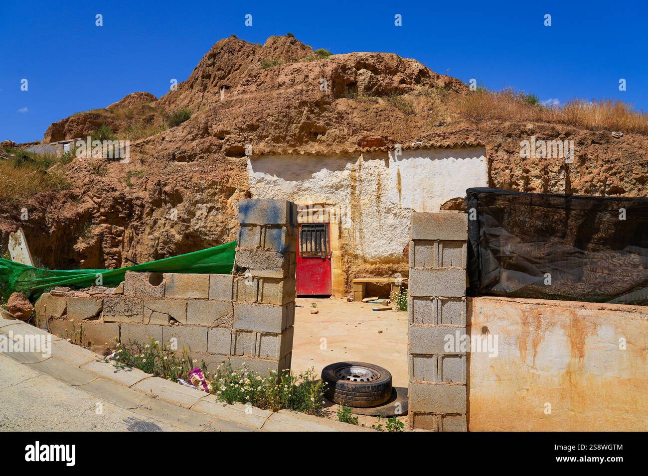 Isolated troglodyte cave-house in Guadix, Andalucia, in the south of ...
