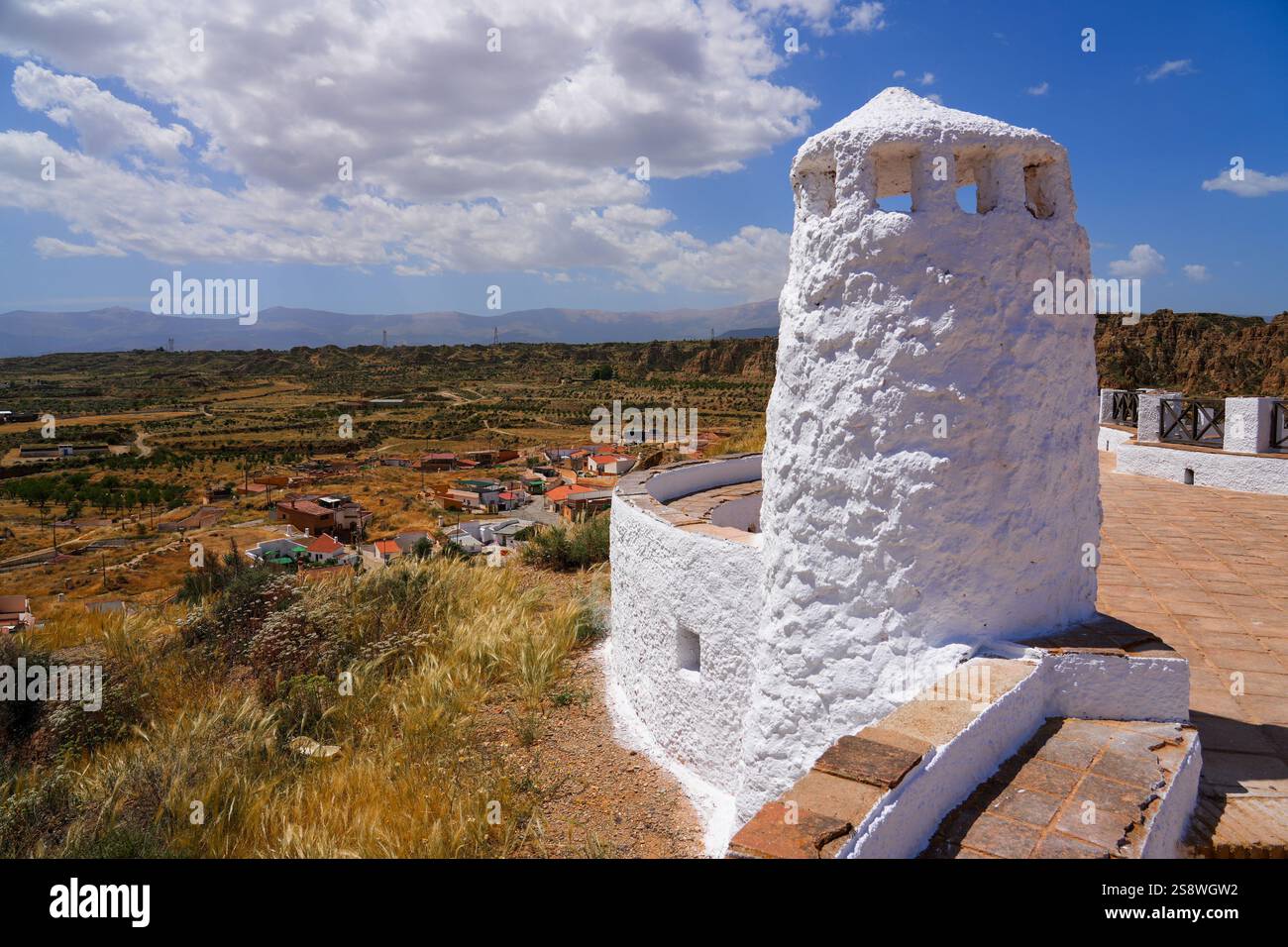 White ventilation shaft on the Mirador de la Cuevas lookout in Guadix ...