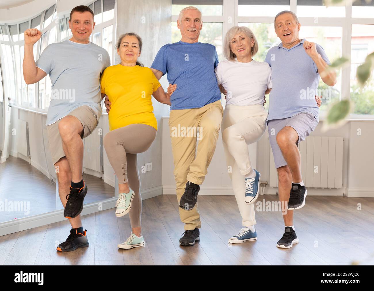Group of elderly men and women dancing folk dances Stock Photo - Alamy