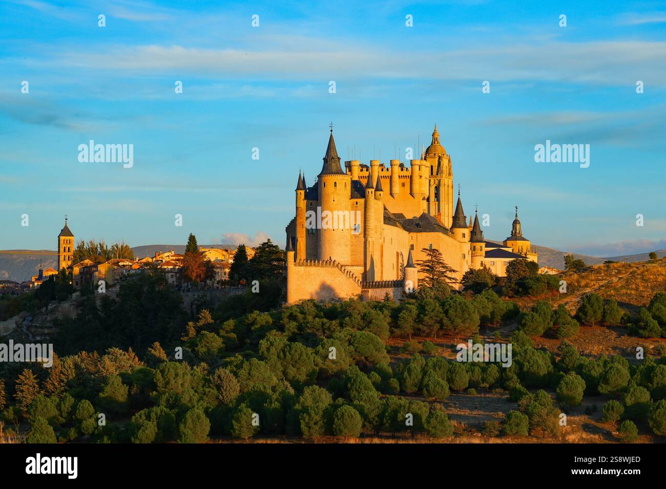 Alcázar of Segovia, a medieval castle built on a rocky crag in Castile ...